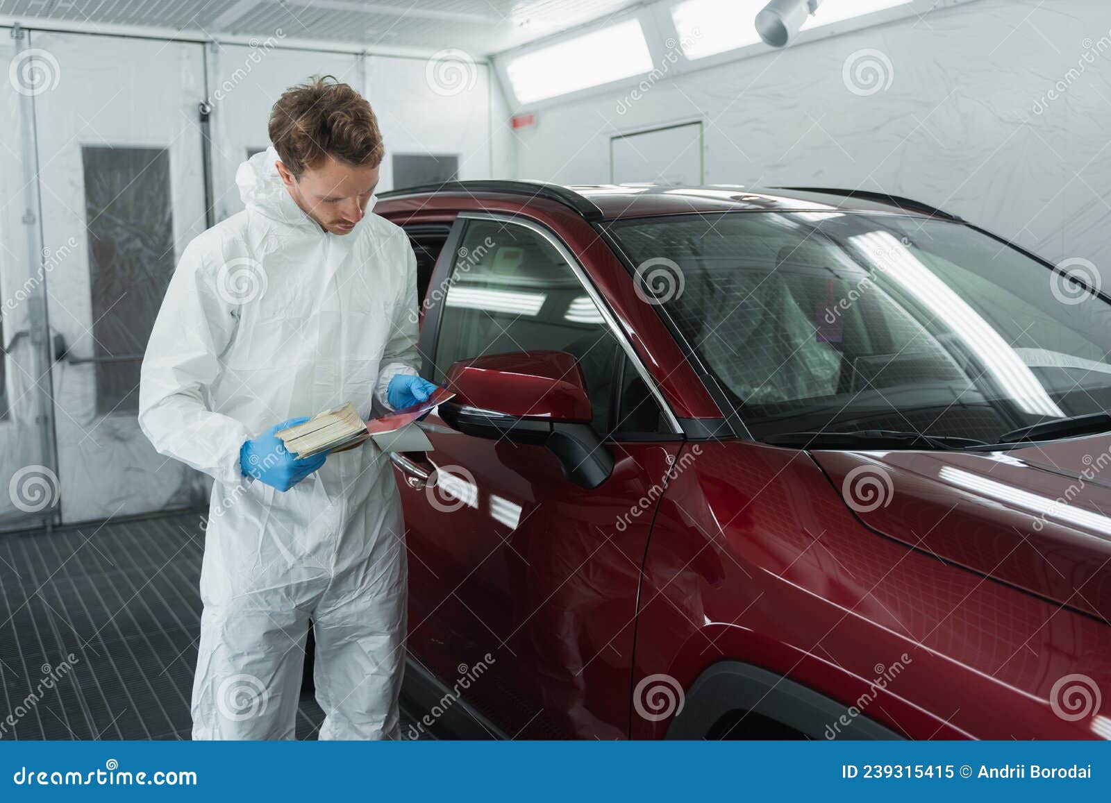 Auto Colorist Selects Car Paint Color with Samples. Stock Image - Image ...