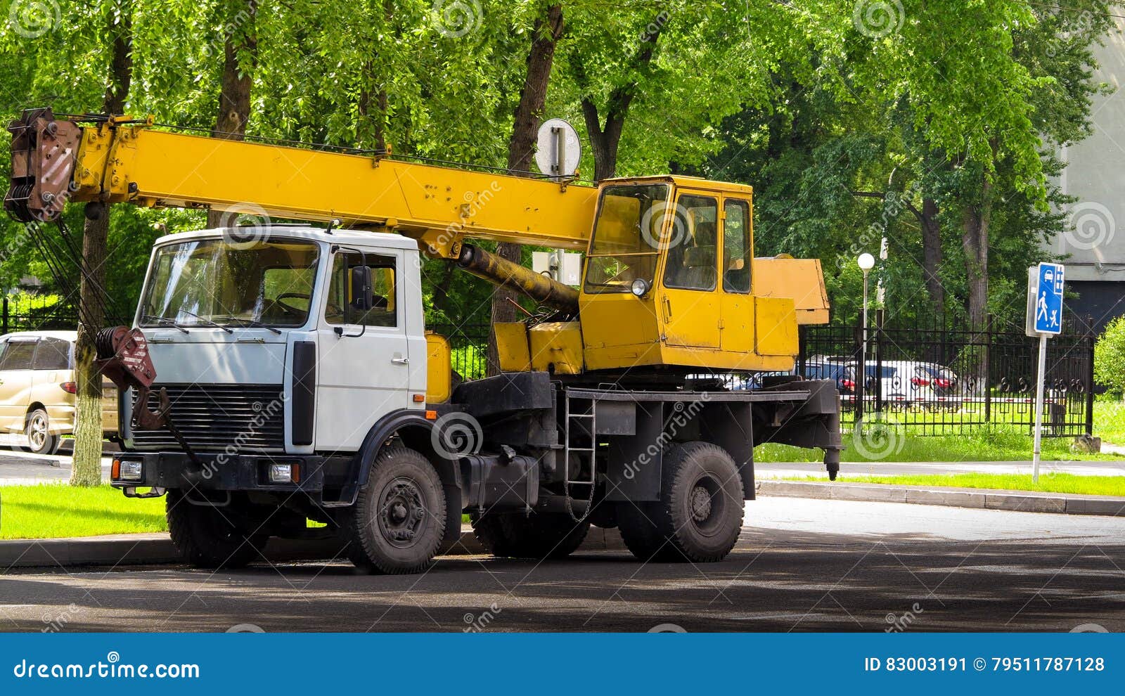 Auto crane on the road stock image. Image of machine - 83003191