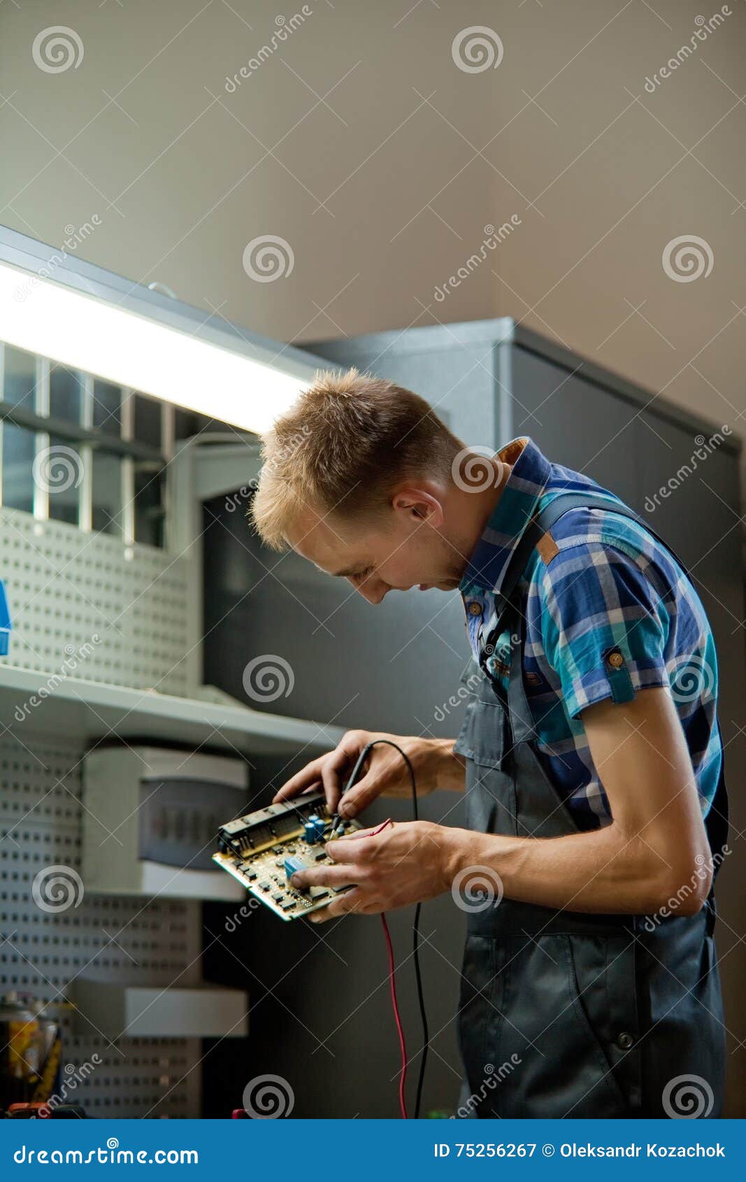 Auto Electrical Worker in Garage. Stock Image - Image of engine ...