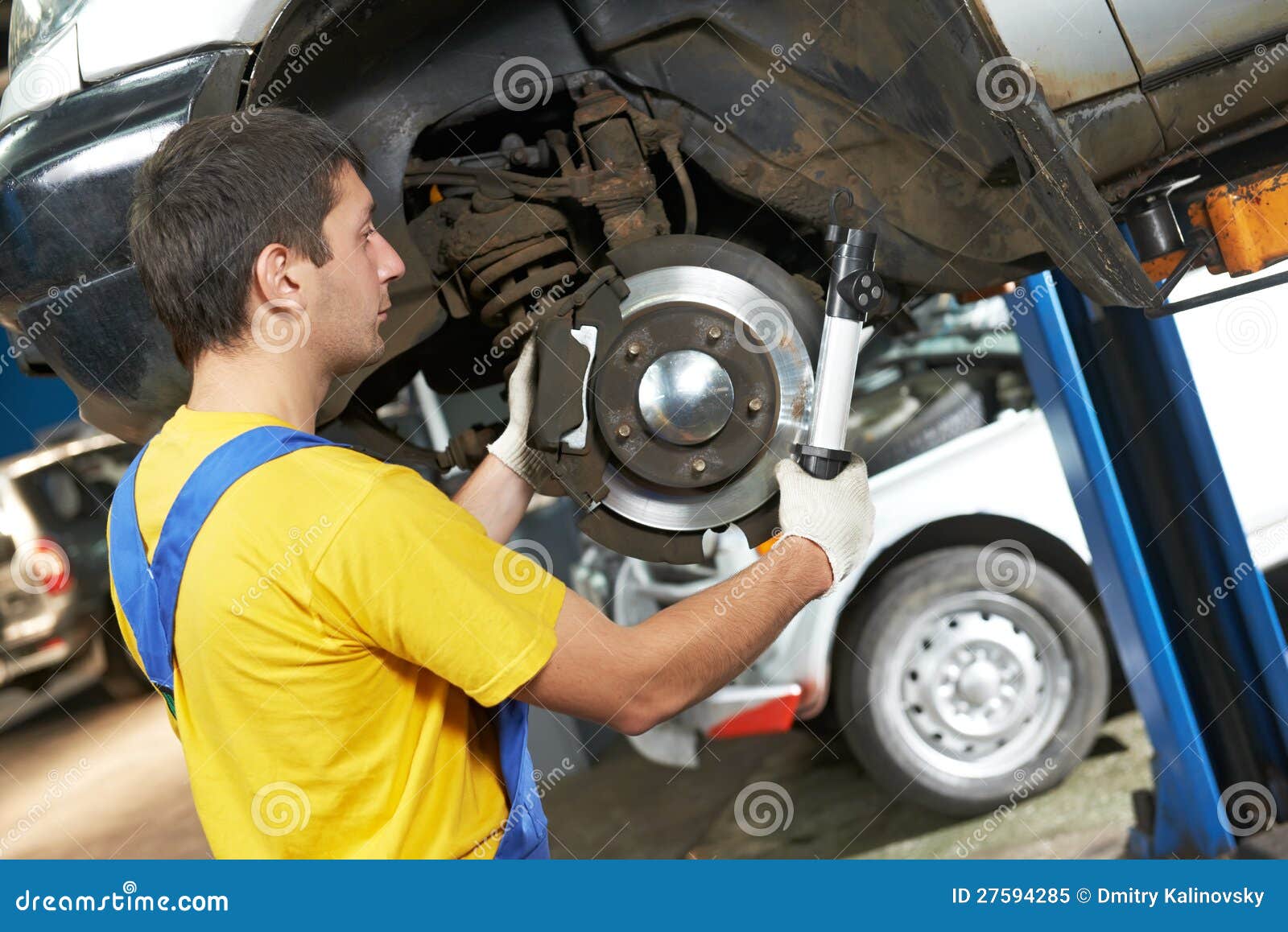 Auto Mechanic at Car Suspension Repair Work Stock Image - Image of ...