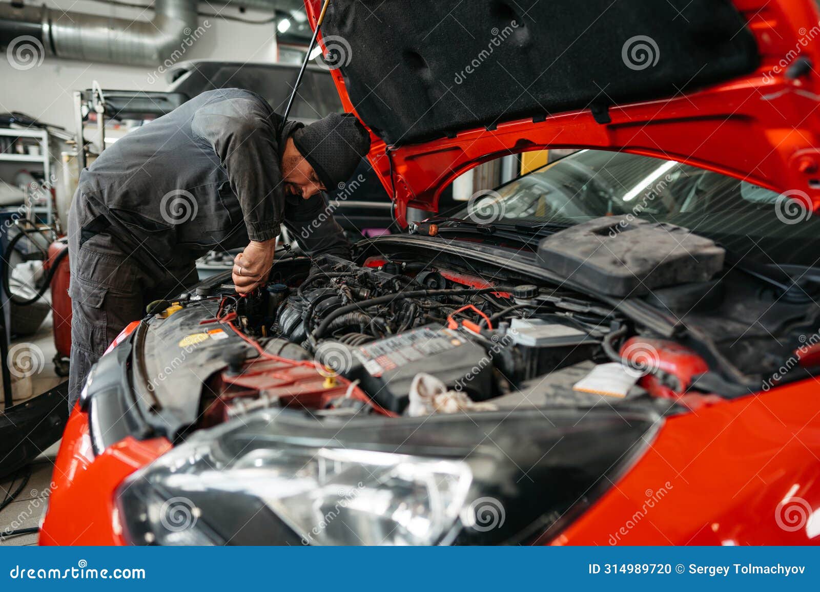 Auto Mechanic Checking Engine in Garage Repair Service Stock Photo ...