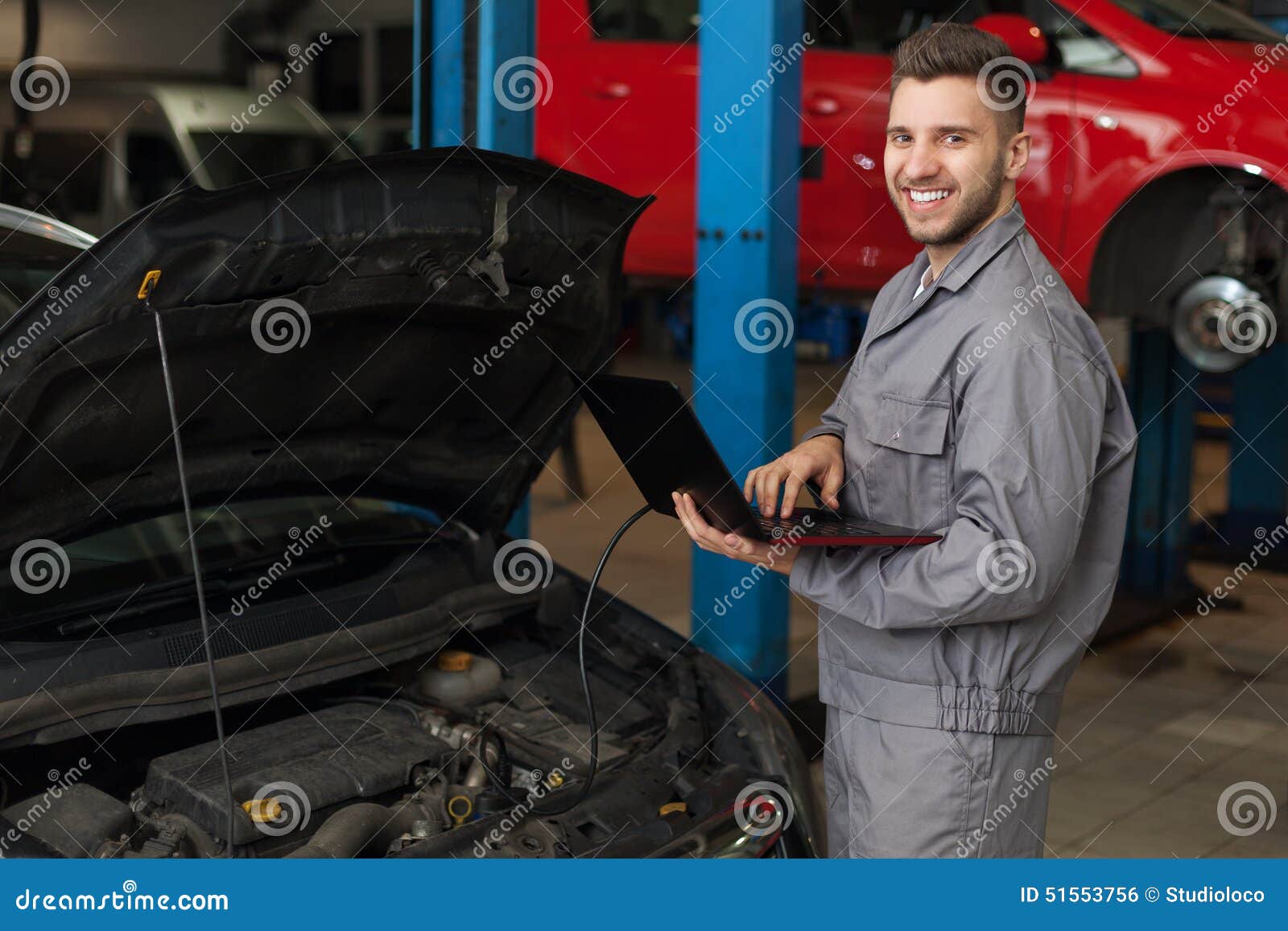 Auto Mechanic Checking the Engine Stock Photo - Image of holding ...