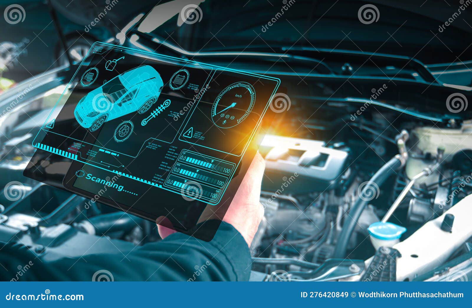 Auto Mechanic Checking Engine System with OBD2 Wireless Scanning Tool ...