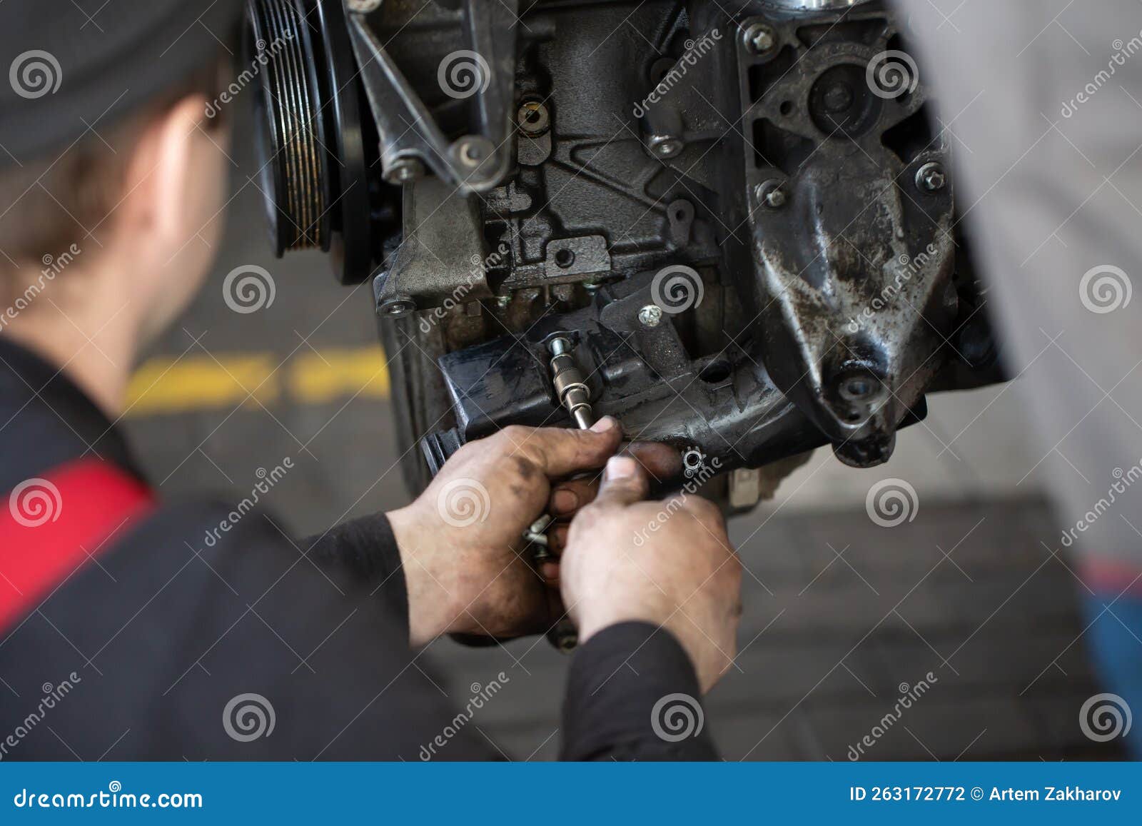 Auto Mechanic Checking an Internal Combustion Engine Stock Photo ...
