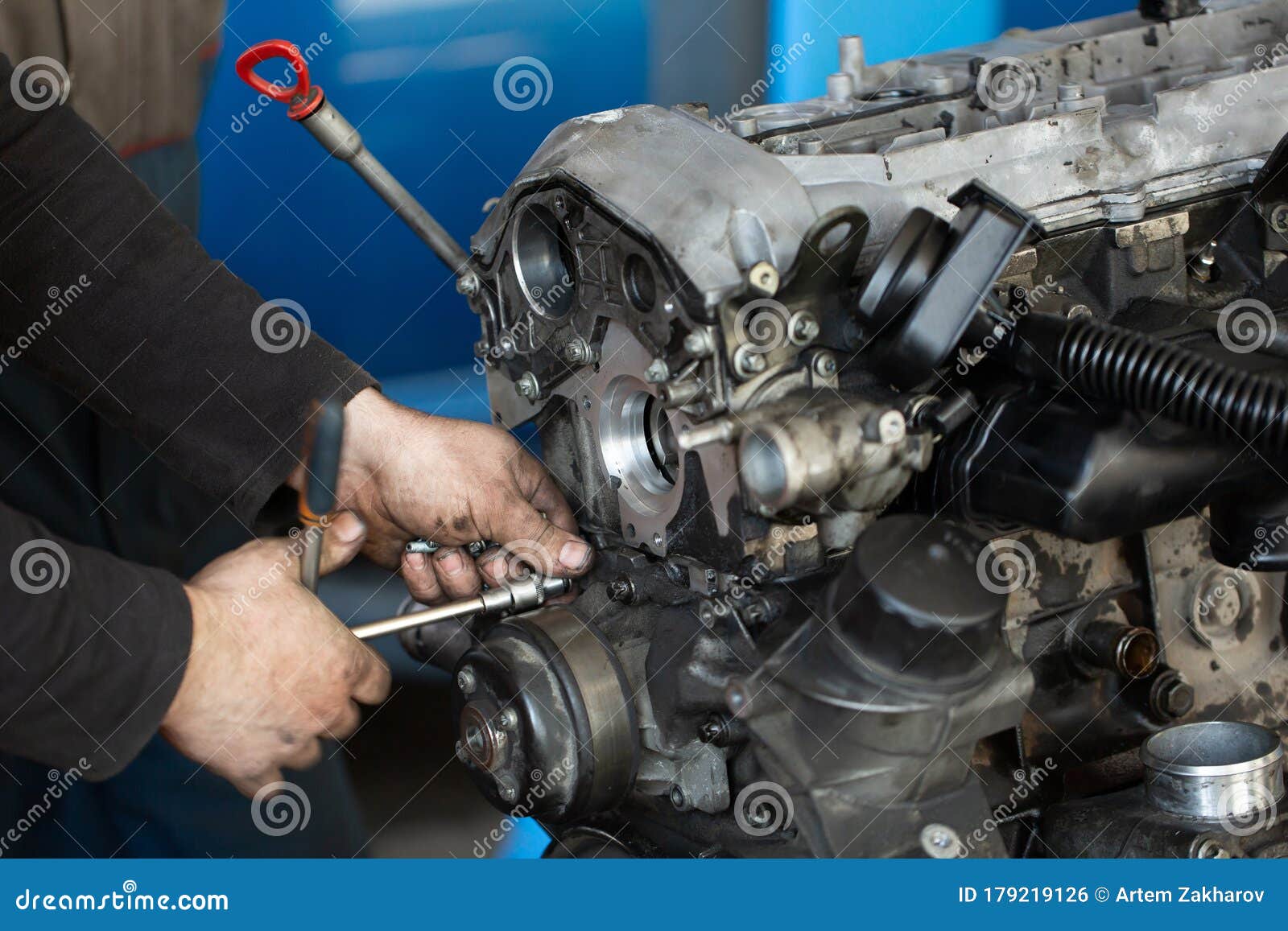 Auto Mechanic Checking an Internal Combustion Engine Stock Photo ...