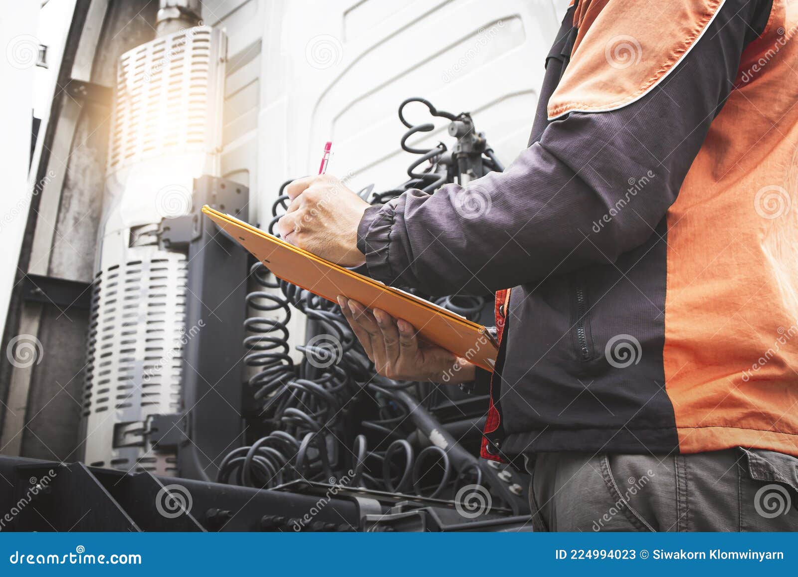 Auto Mechanic Driver Holding Clipboard is Checking Maintenance and ...