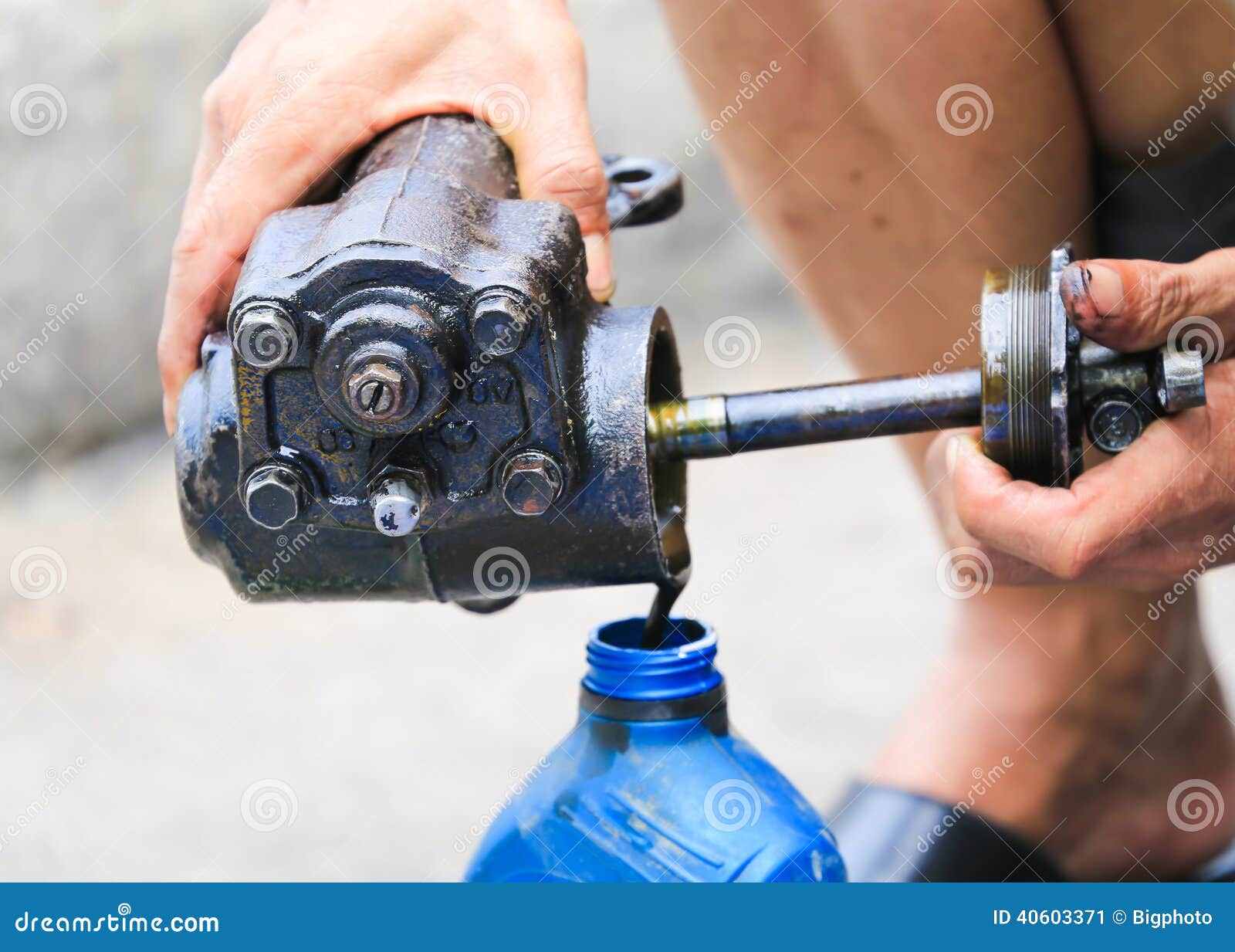 Auto Mechanic Hand Holding Motor Oil Stock Image - Image of lubrication ...