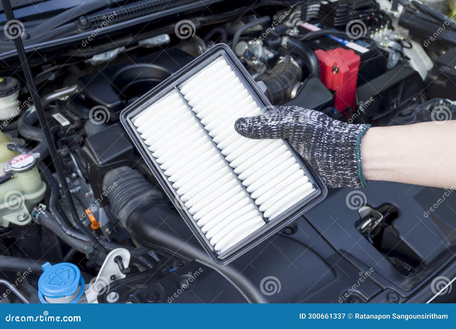 Auto Mechanic Hand with New Car Engine Air Filter, Car Maintenance ...