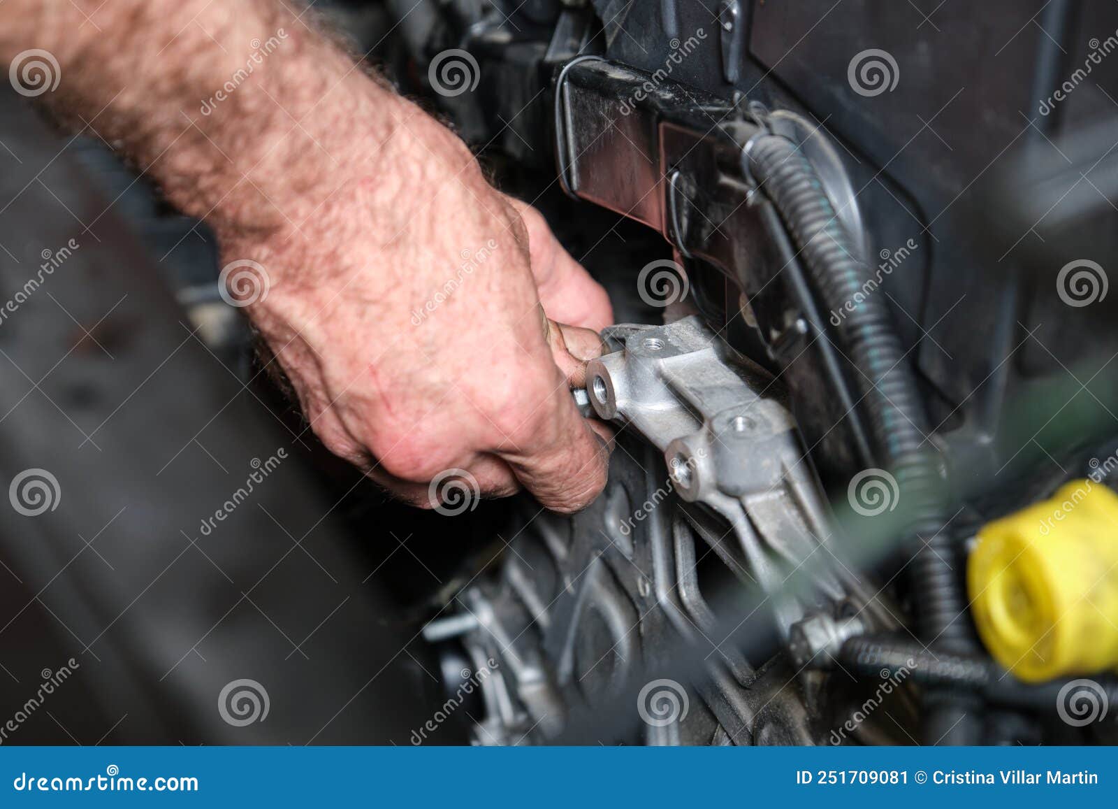 Auto Mechanic Hands Screws the Engine Mount after Replace the Timing ...