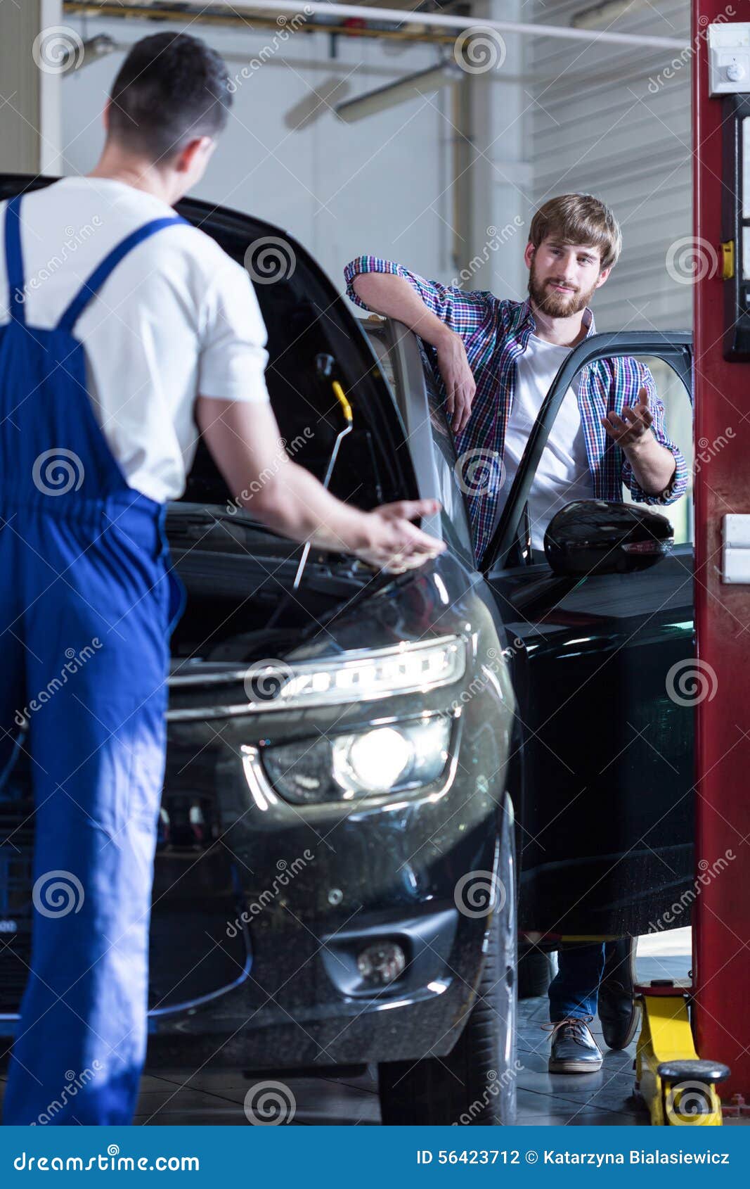 Auto Mechanic Servicing a Car Stock Photo - Image of automobile, motor ...