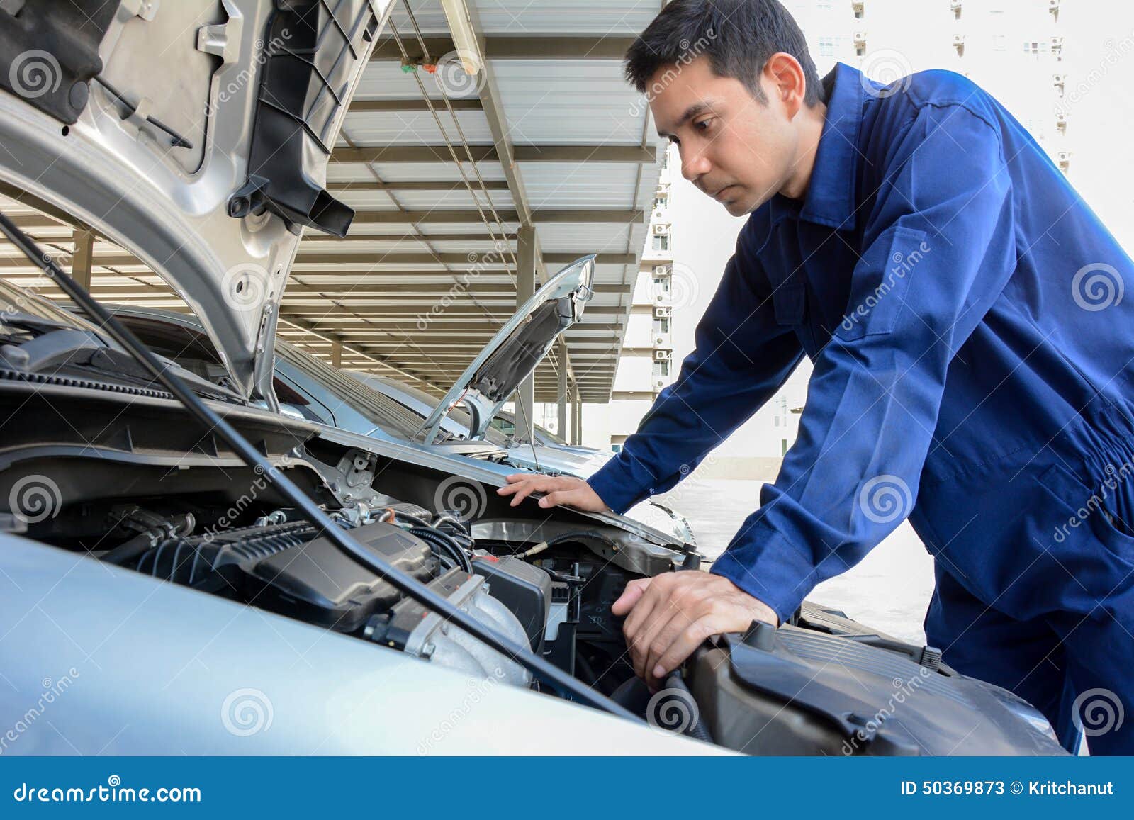 Auto Mechanic (or Technician) Checking Car Engine Stock Image - Image ...