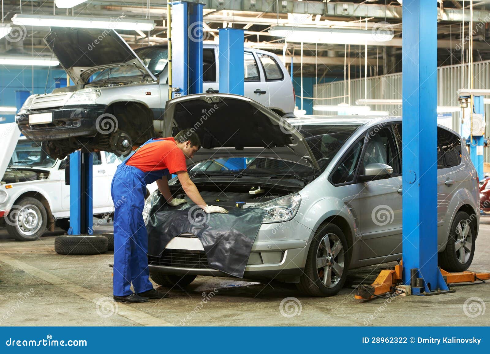 Auto mechanic at work stock photo. Image of garage, control - 28962322