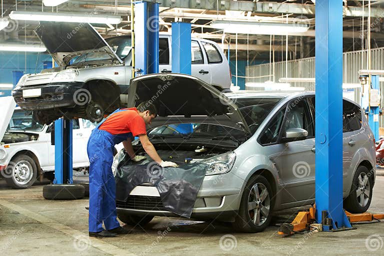 Auto mechanic at work stock photo. Image of garage, control - 28962322