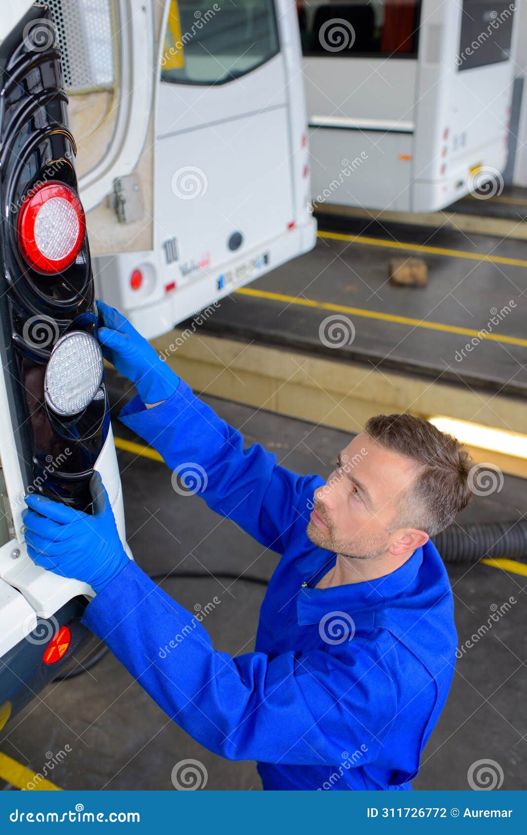 Auto Mechanic Worker Fixing Bus Stock Photo - Image of crash, cleaner ...