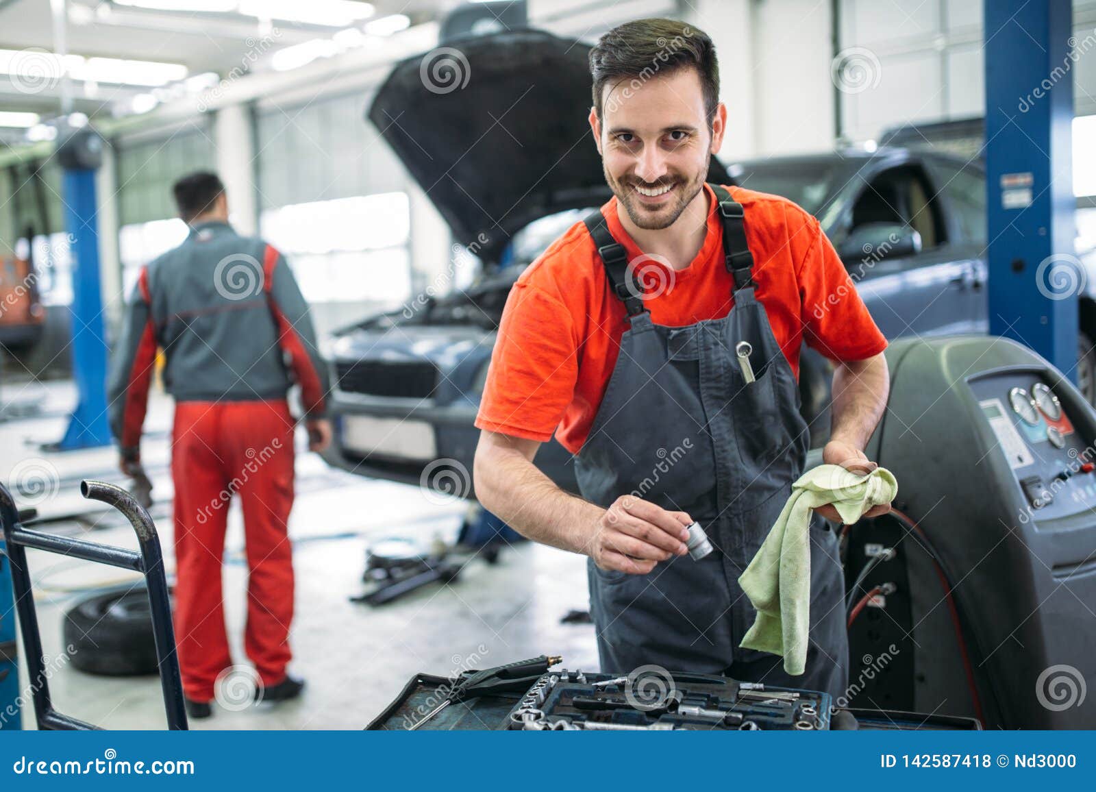 Auto Mechanic Working in Garage. Repair Service Stock Photo - Image of ...
