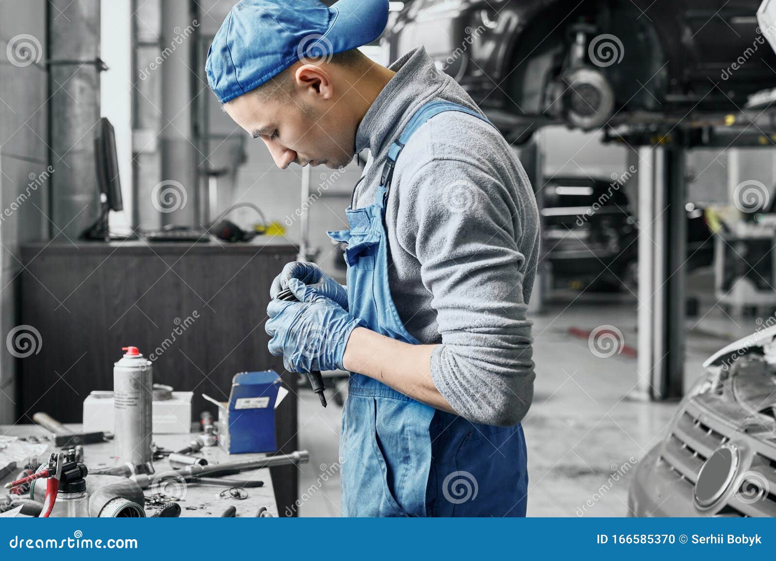 Auto Mechanic Working Near Table with Different Tools Stock Photo ...