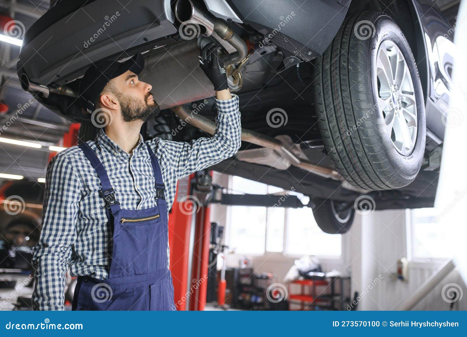 Auto Mechanic Working at Auto Repair Shop Stock Photo - Image of ...
