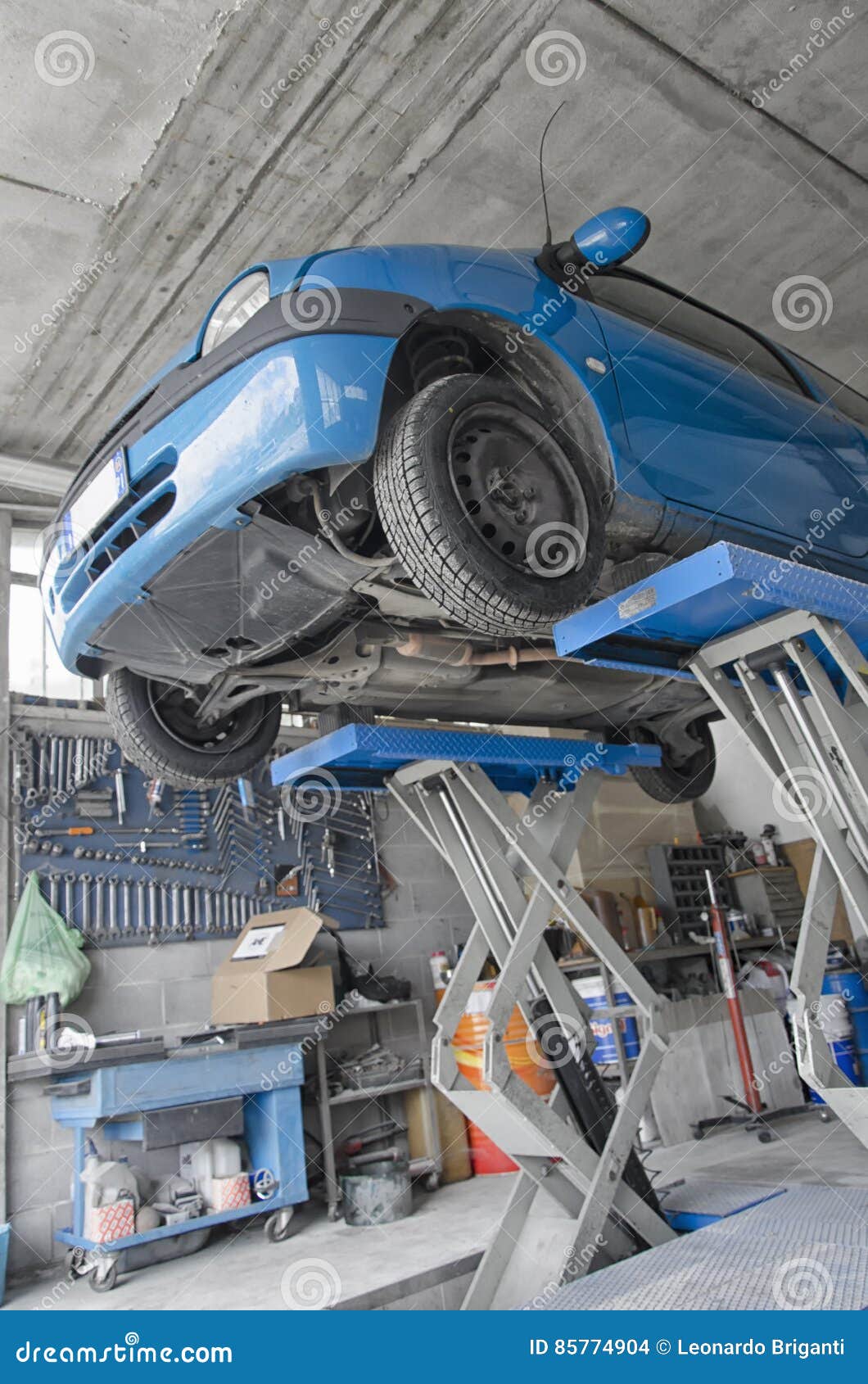 Auto Raised by the Car Lift Stock Photo - Image of body, equipment ...