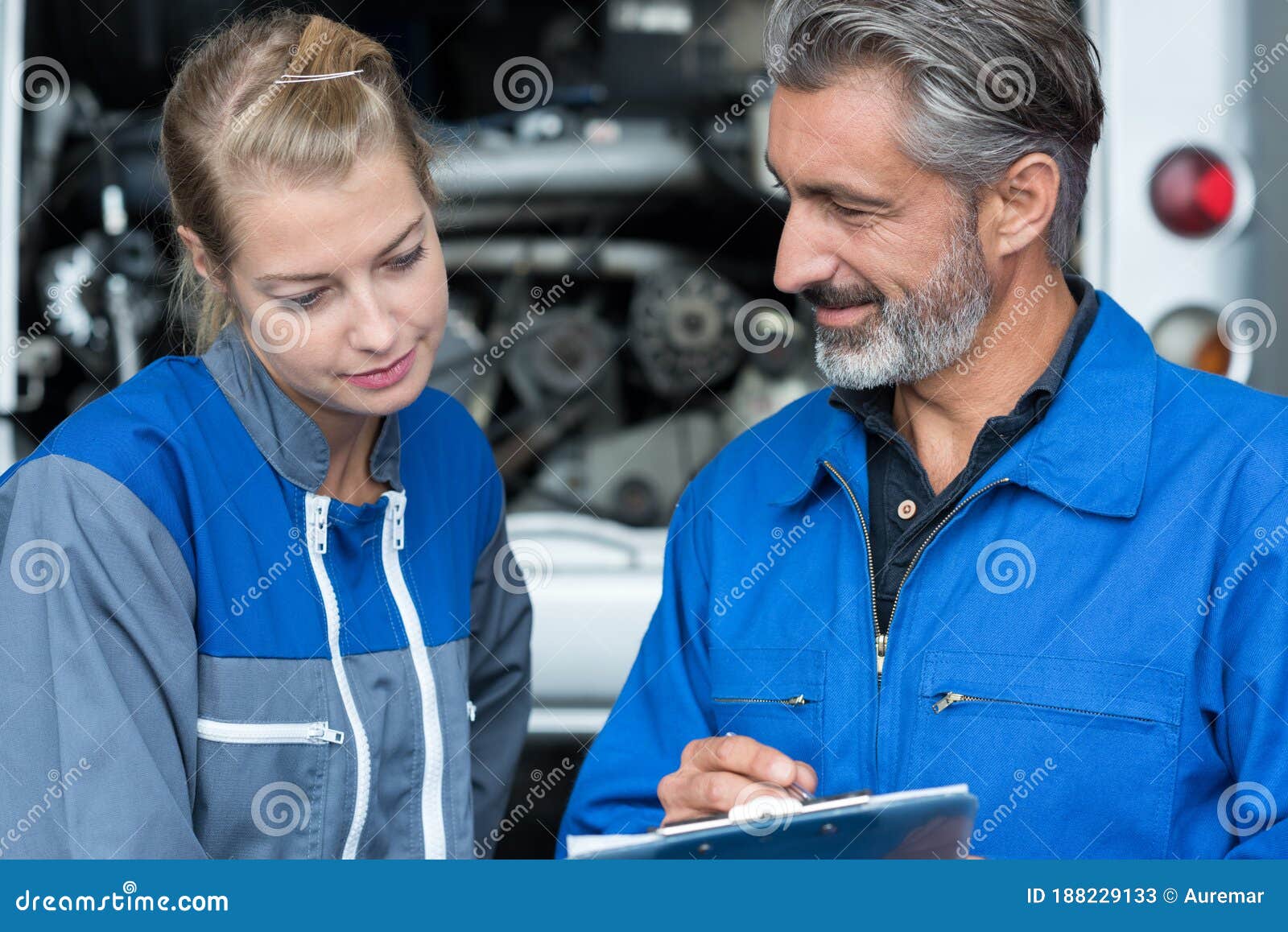 Auto repair shop workers stock image. Image of assistant - 188229133