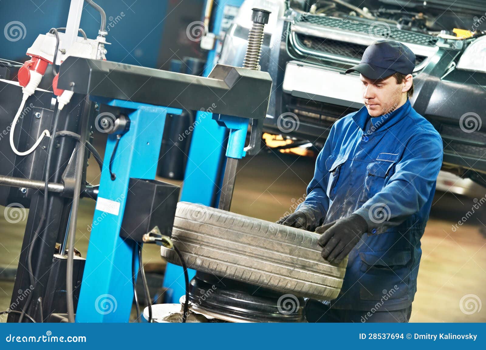 Auto Repairman at Tyre Replacement Place Stock Photo - Image of fitter ...