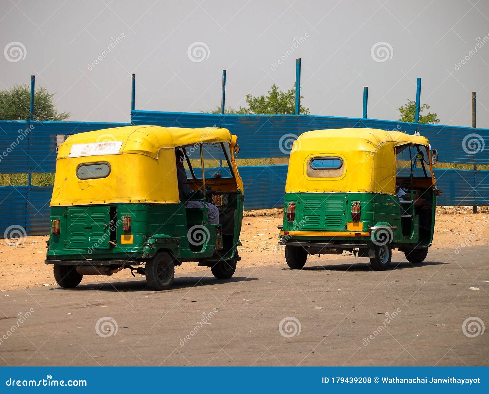 Auto Rickshaw Car Have Green and Yellow Color on New Delhi City, India ...