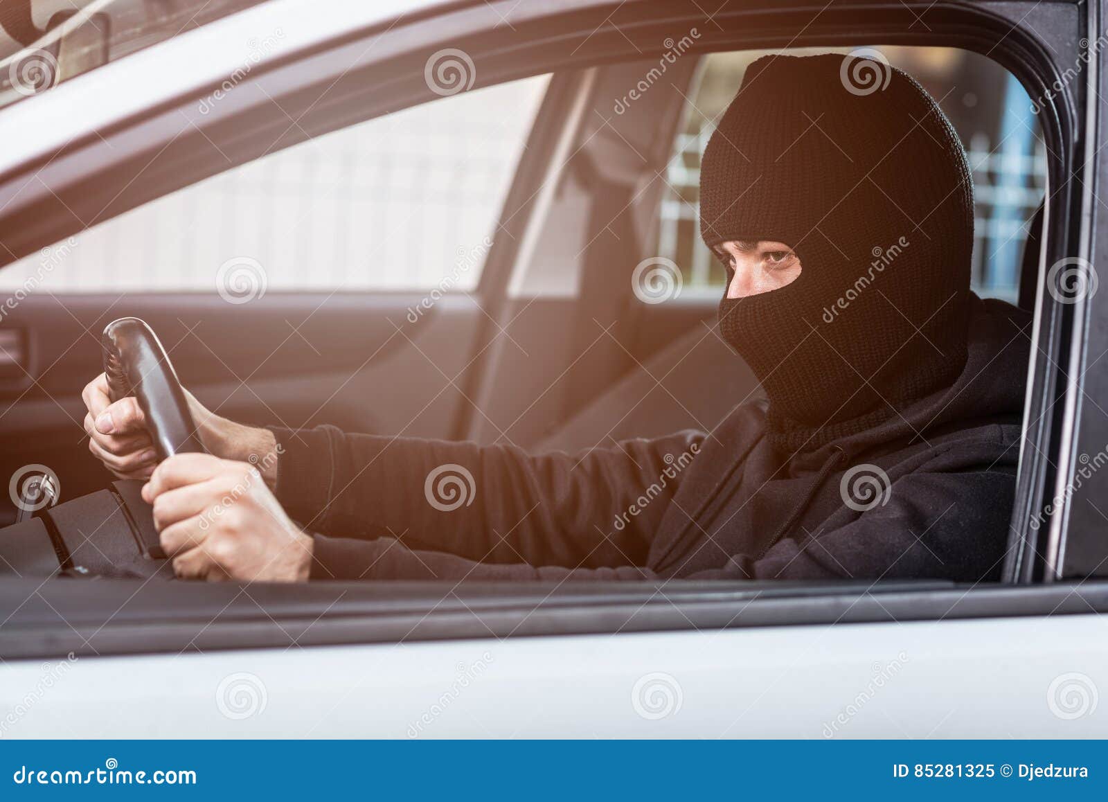 Auto Thief Driving a Stolen Car Stock Image - Image of open, mask: 85281325