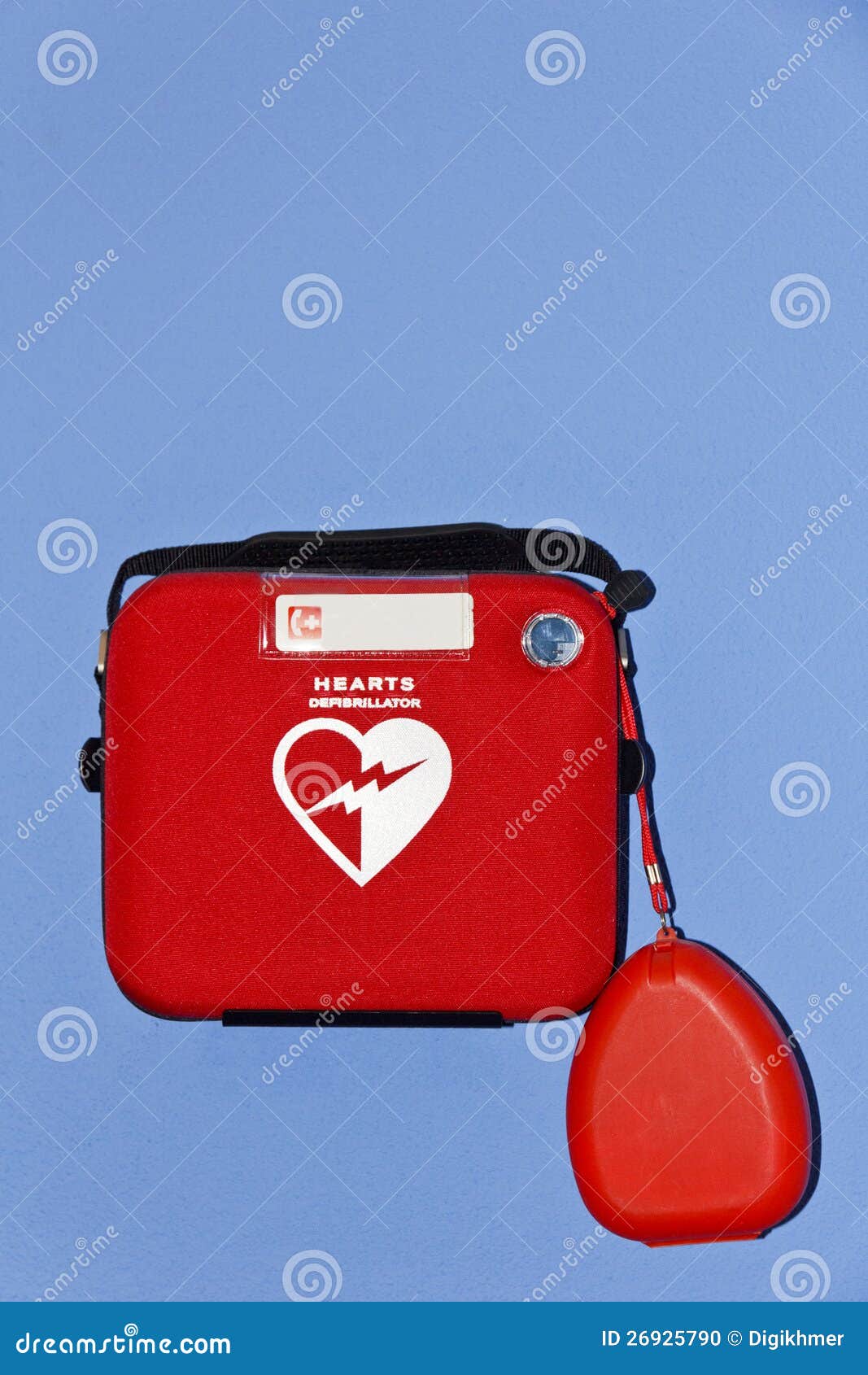 Automated External Defibrillator on Blue Wall Stock Photo - Image of ...
