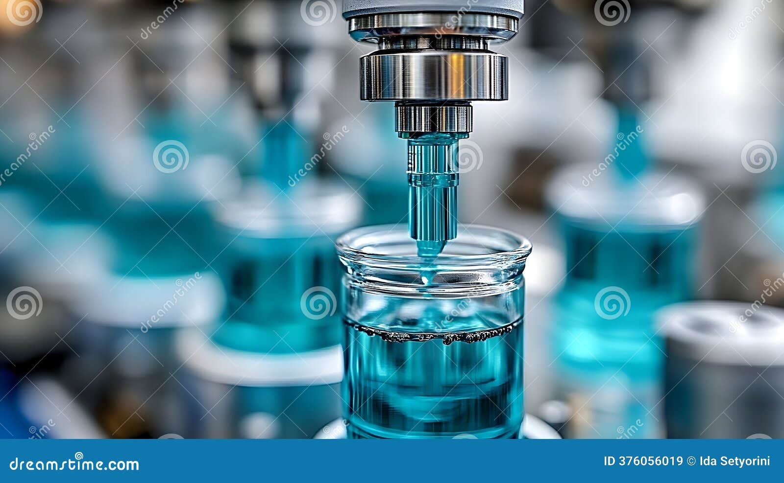 Automated Liquid Handling System Dispensing Sample Into Microplate ...