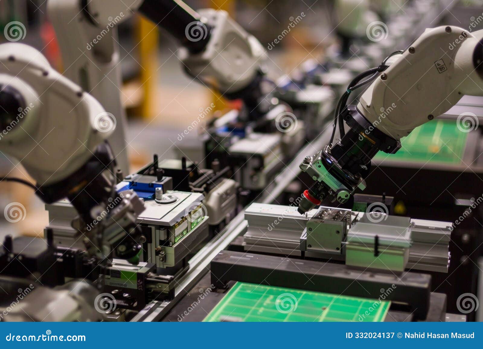 Automated Robotic Arms Assembling Components in a Hightech Electronics ...