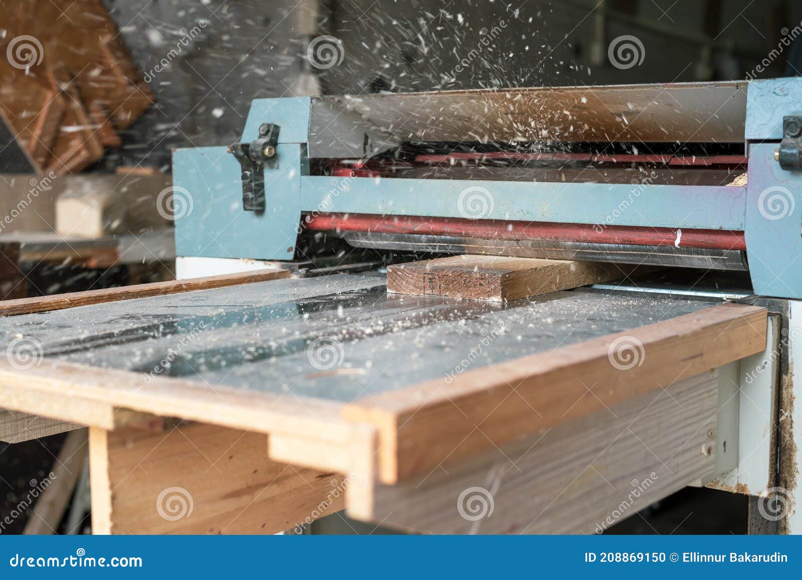 Automated Sanding Machine for Wood Boards. Wood Dusts Scattered ...