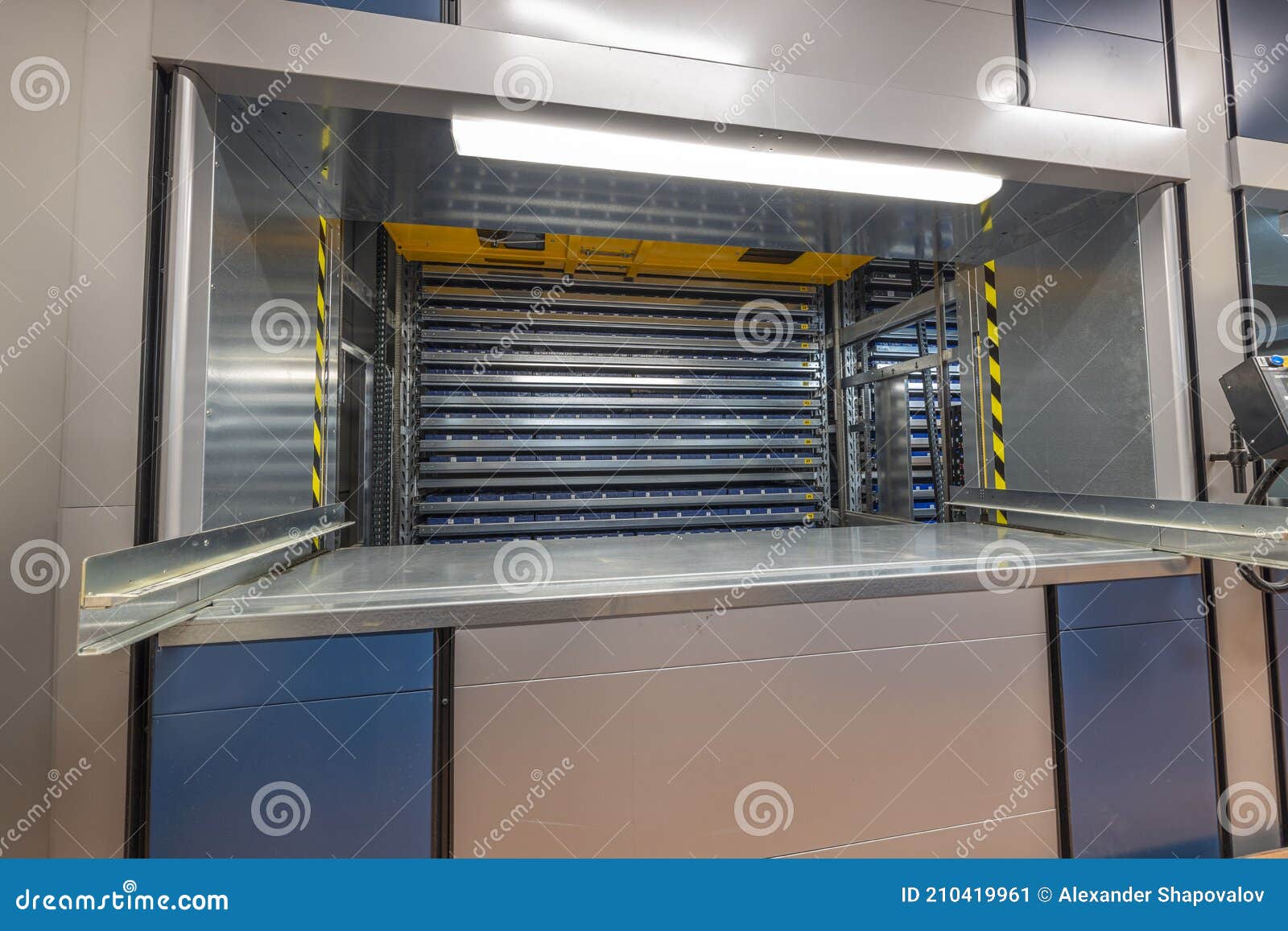 Automated Storage System in the Warehouse. Vertical Carousel Storage ...