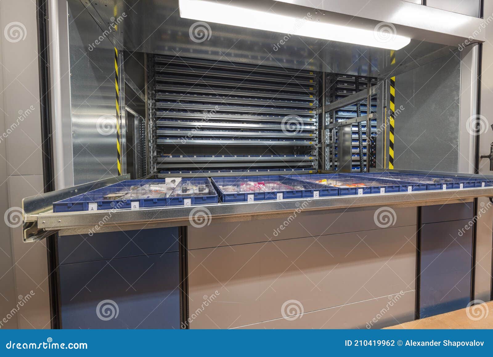 Automated Storage System in the Warehouse. Vertical Carousel Storage ...