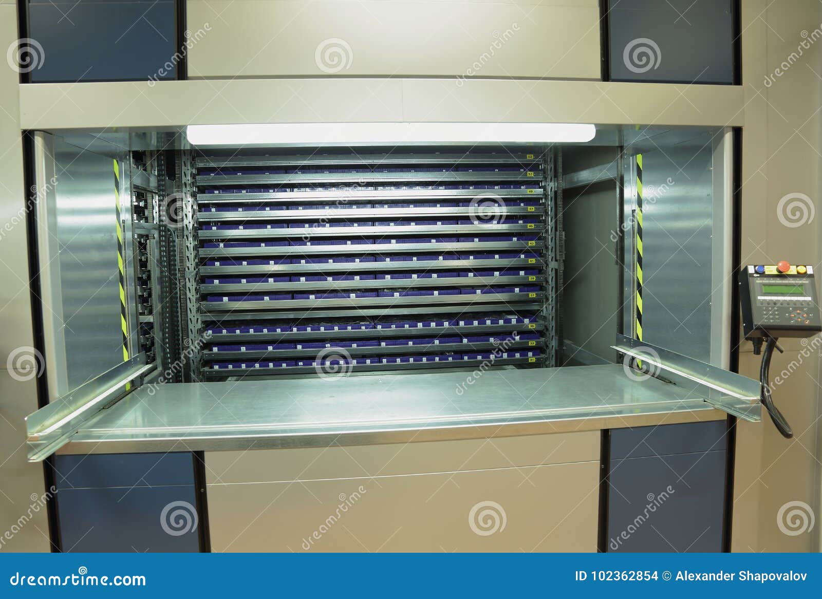 Automated Vertical Carousel Storage Unit in the Warehouse Stock Photo ...