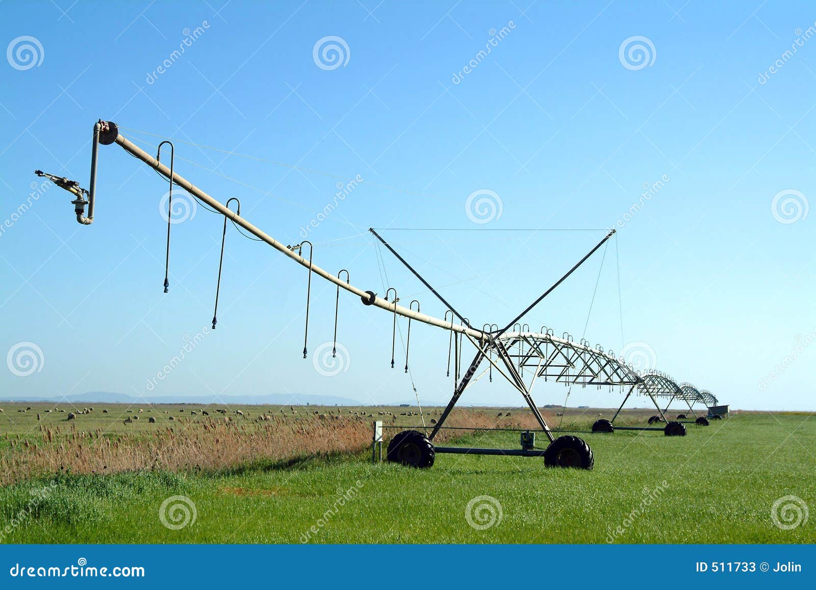 Automated water sprinklers stock image. Image of landscape - 511733