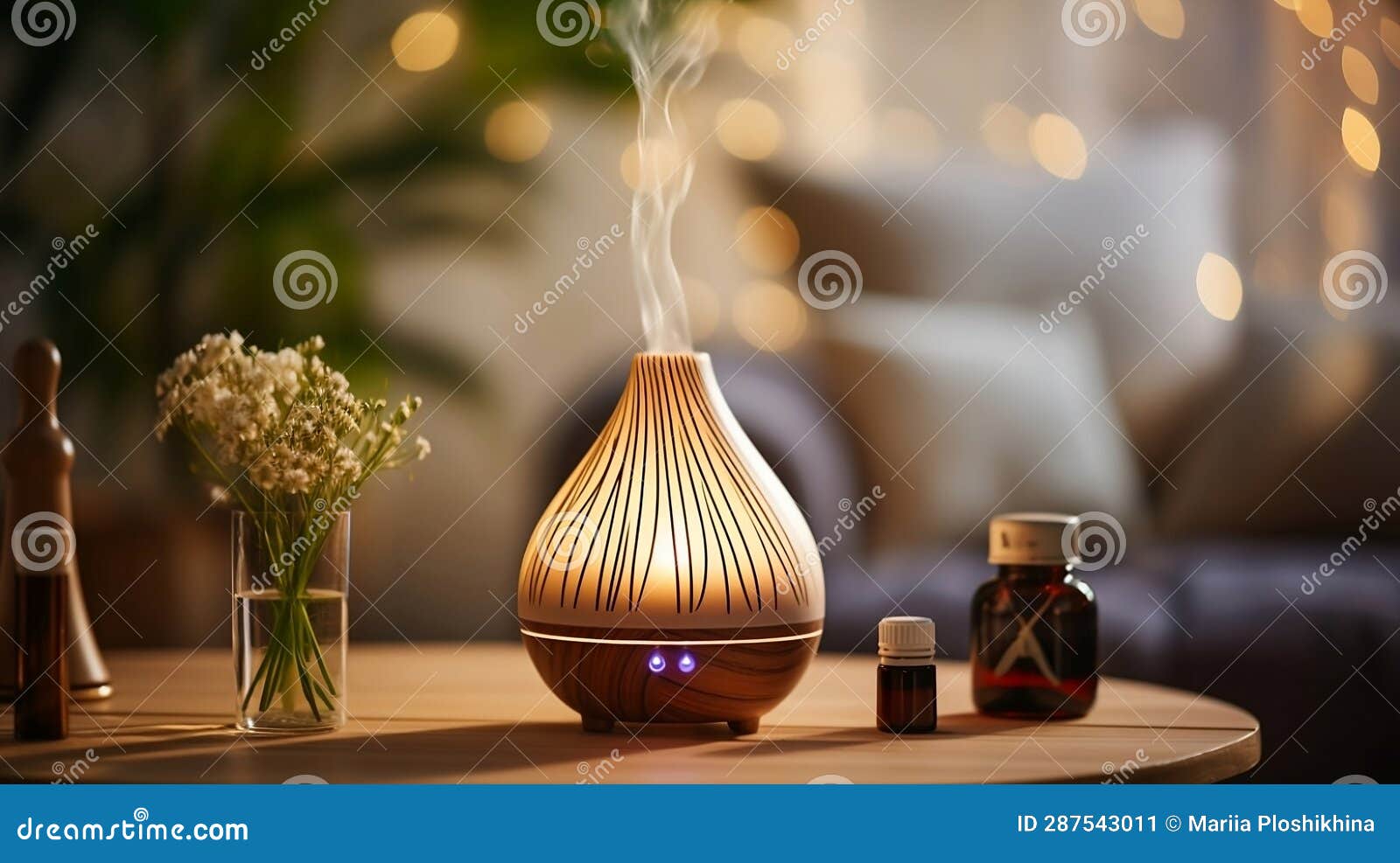 Automatic Aroma Oil Diffuser with Rising Steam Flow on Table in Cozy ...