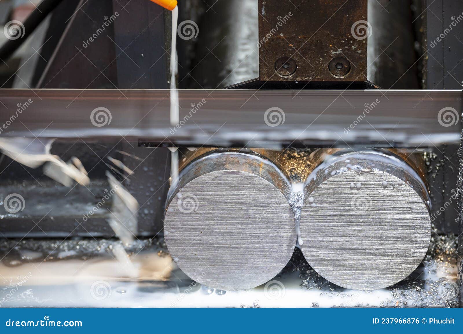 The Automatic Band Saw Machine Cutting the Metal Bar with Water Base ...