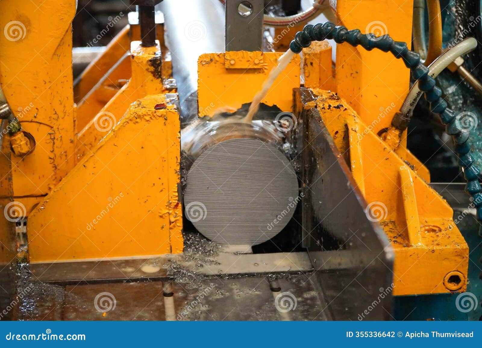 Automatic Band Saw Machine Cutting the Metal Rod with Water Base ...