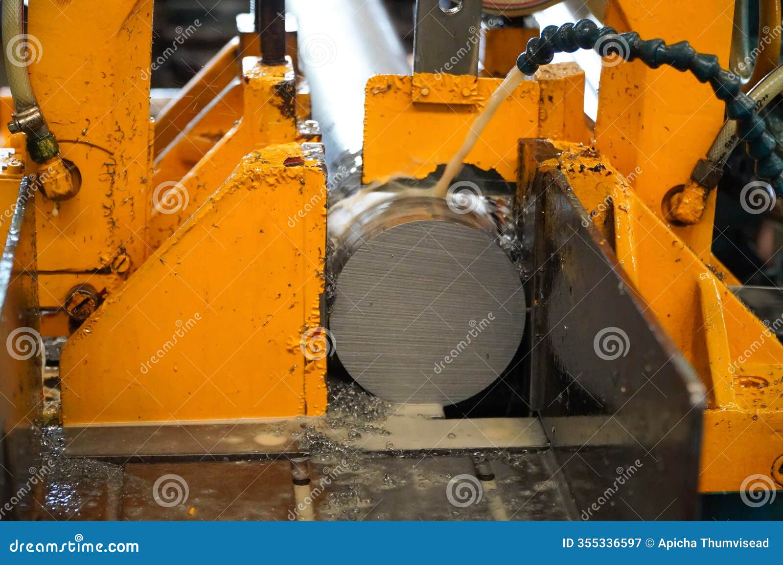 Automatic Band Saw Machine Cutting the Metal Rod with Water Base ...