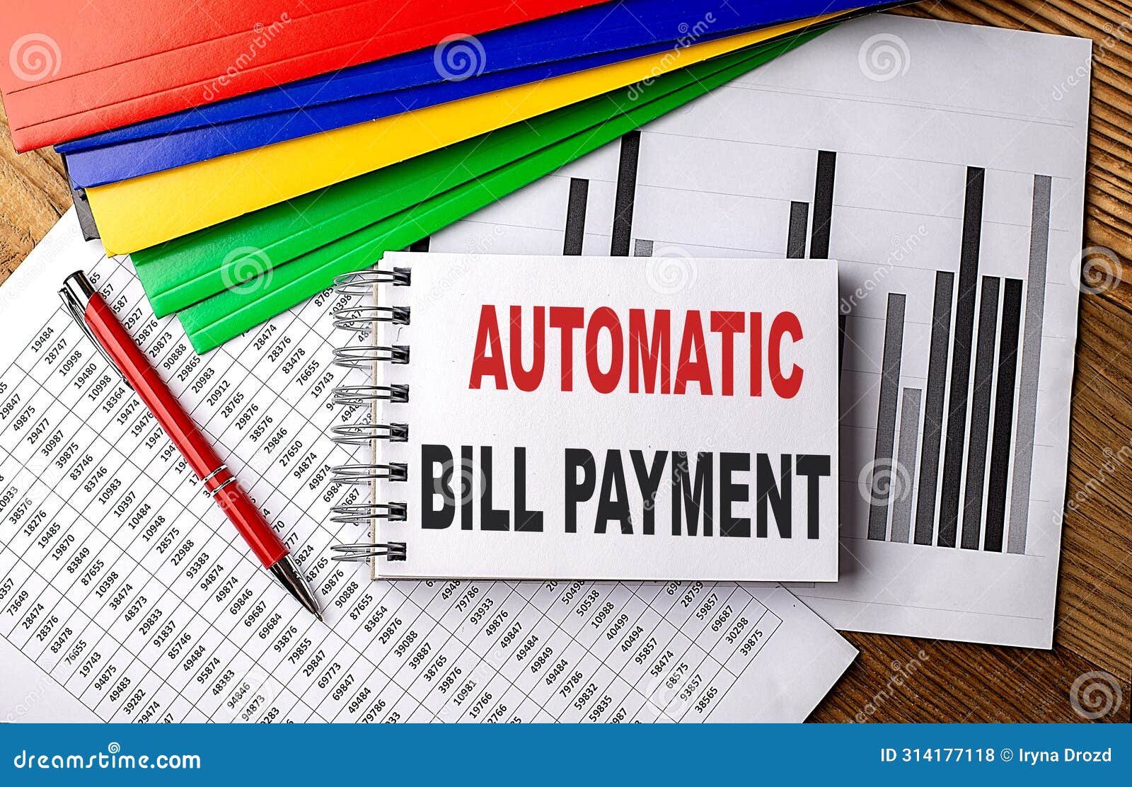 AUTOMATIC BILL PAYMENT Text on Notebook with Folder on Chart Stock ...