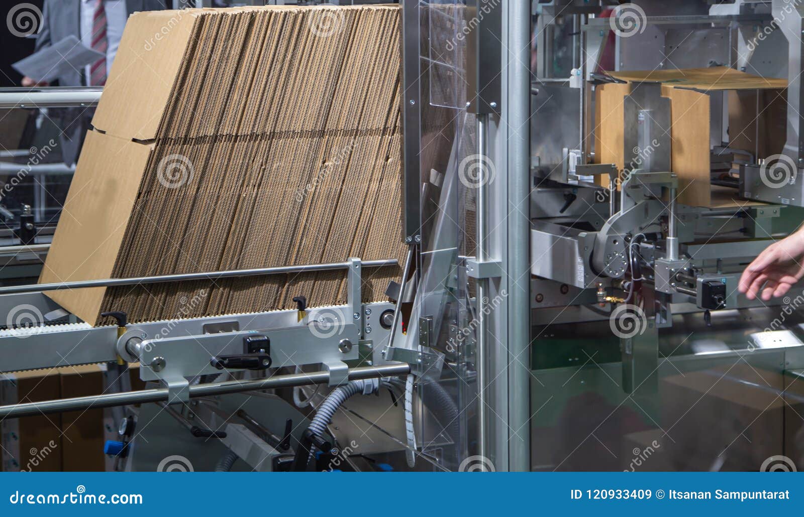 Automatic carton erector stock image. Image of manufacturing - 120933409