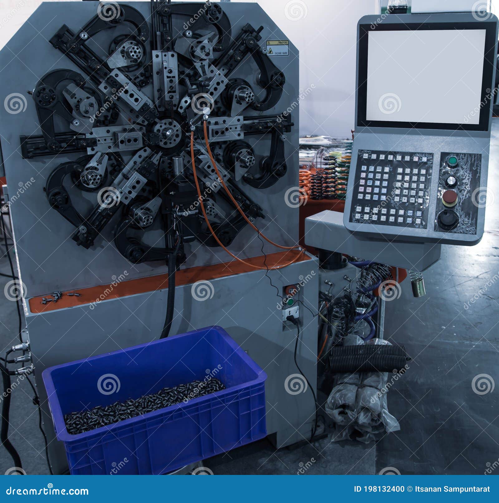 Spring coiling machine editorial image. Image of cord - 198132400