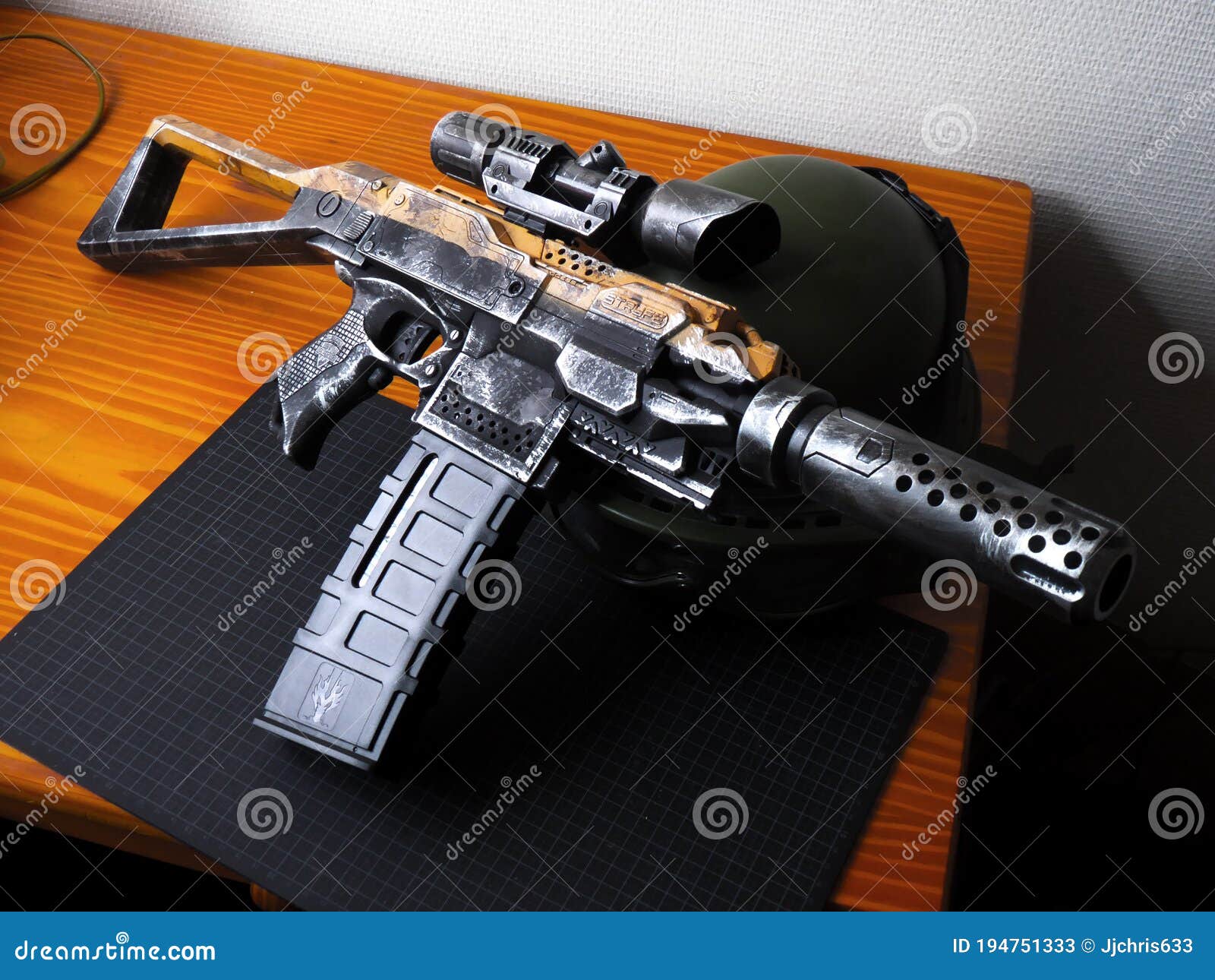 A Automatic Combat Rifle with a Silencer and a Scope. Editorial Stock ...