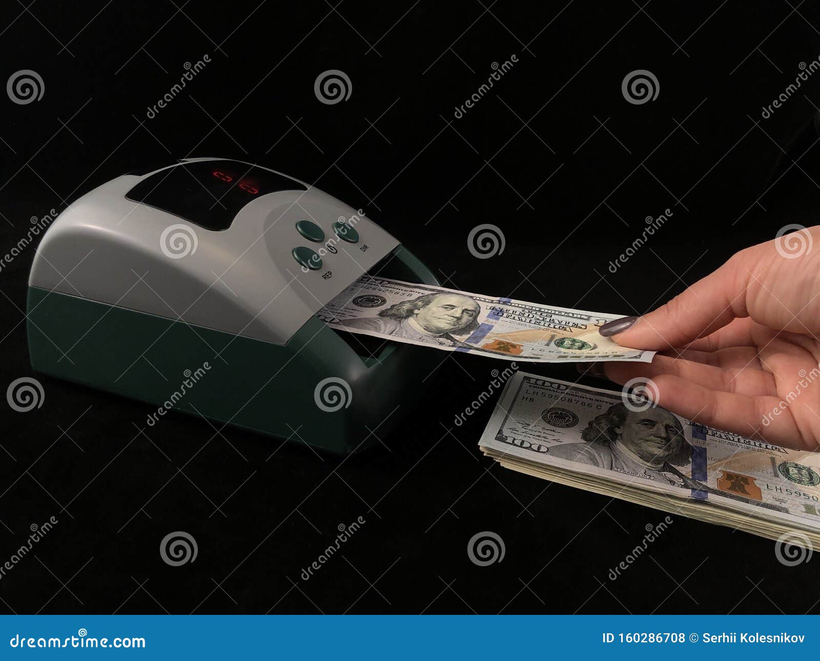 Automatic Detector for Checking Banknotes. Dollars are Checked through ...
