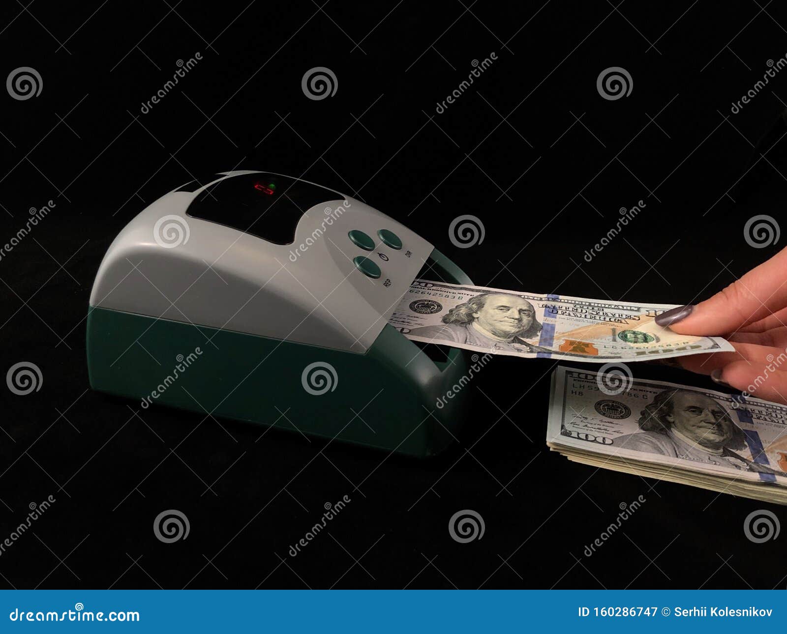 Automatic Detector for Checking Banknotes. Dollars are Checked through ...