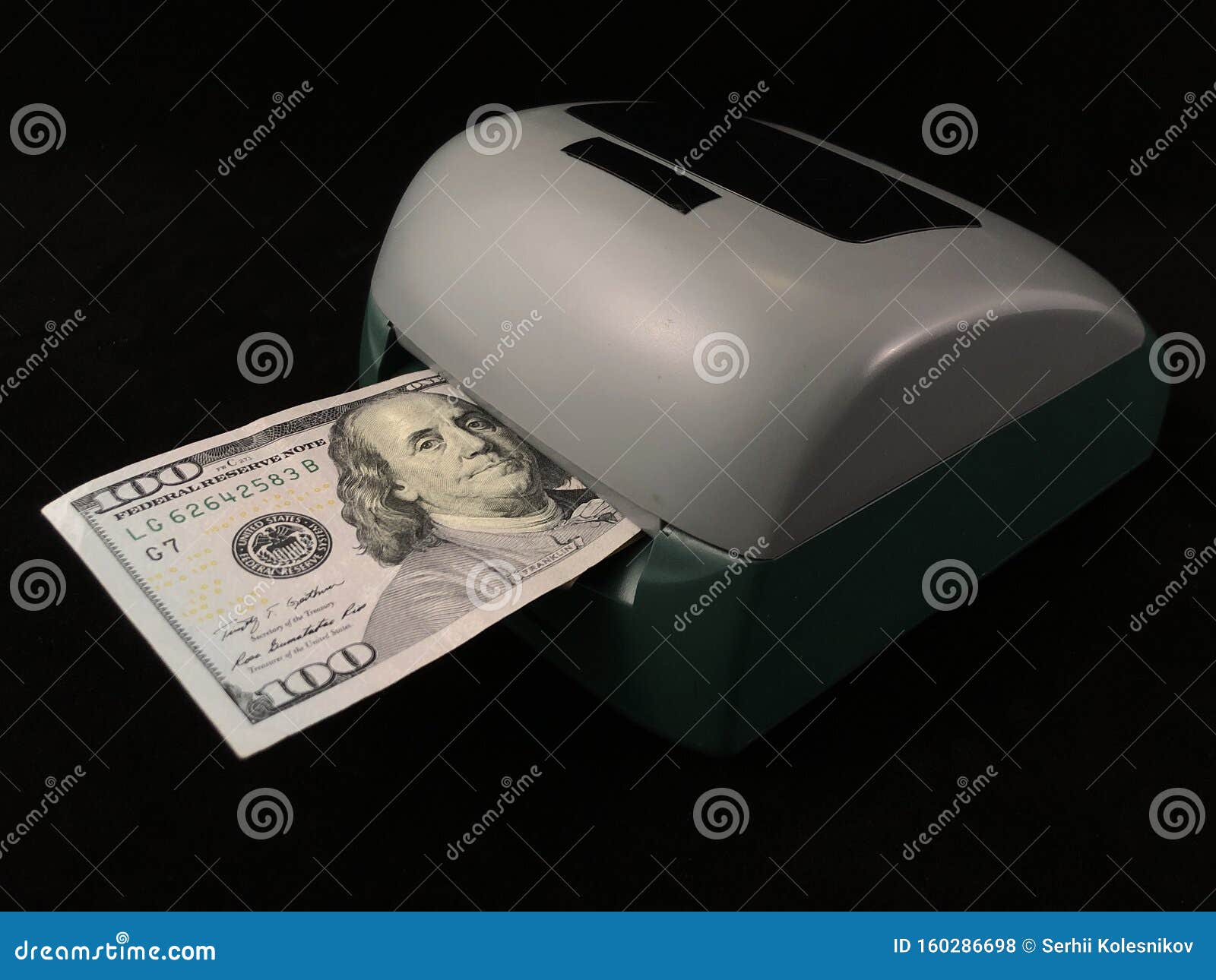 Automatic Detector for Checking Banknotes. Dollars are Checked through ...