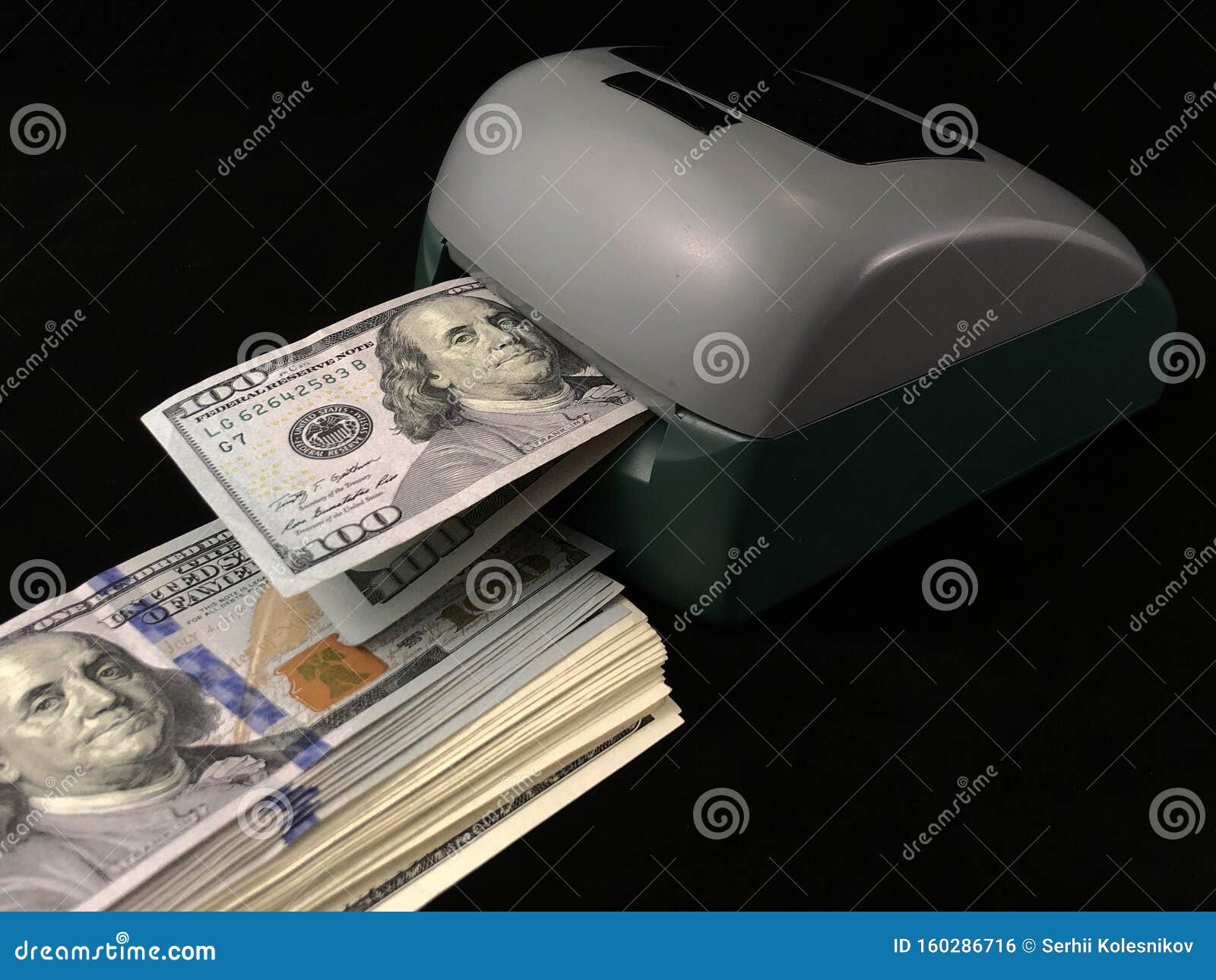 Automatic Detector for Checking Banknotes. Dollars are Checked through ...