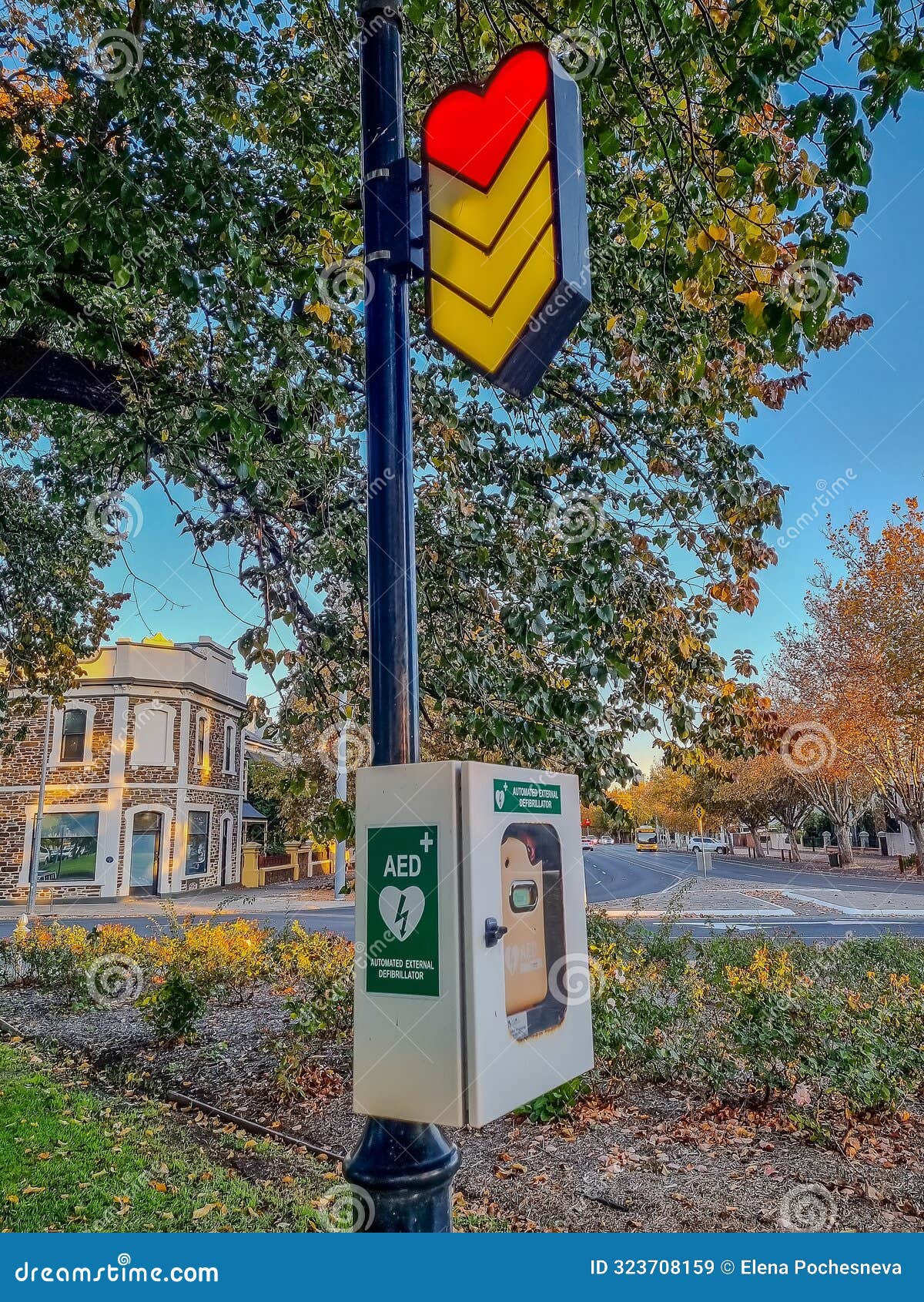 Automatic External Defibrillator Hanging on a Pole in a Public Park for ...
