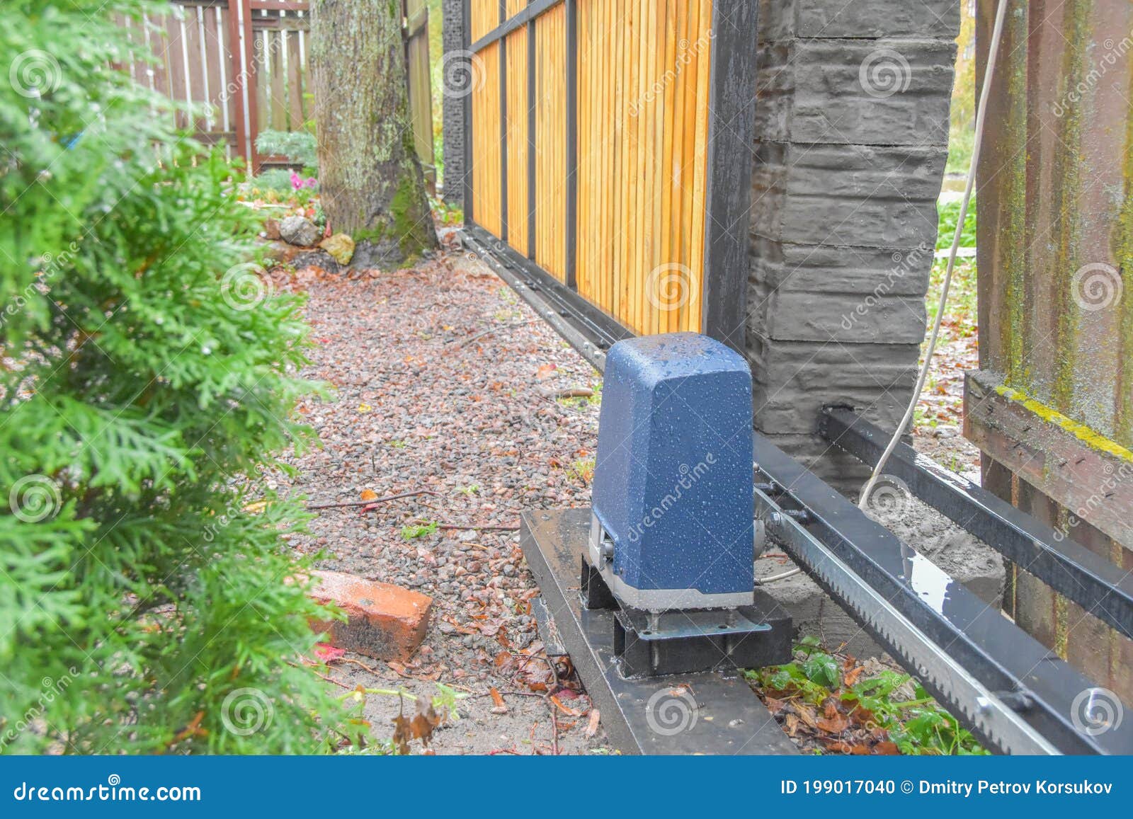 A Automatic Gate Mechanism on the Garden Plot Stock Photo - Image of ...