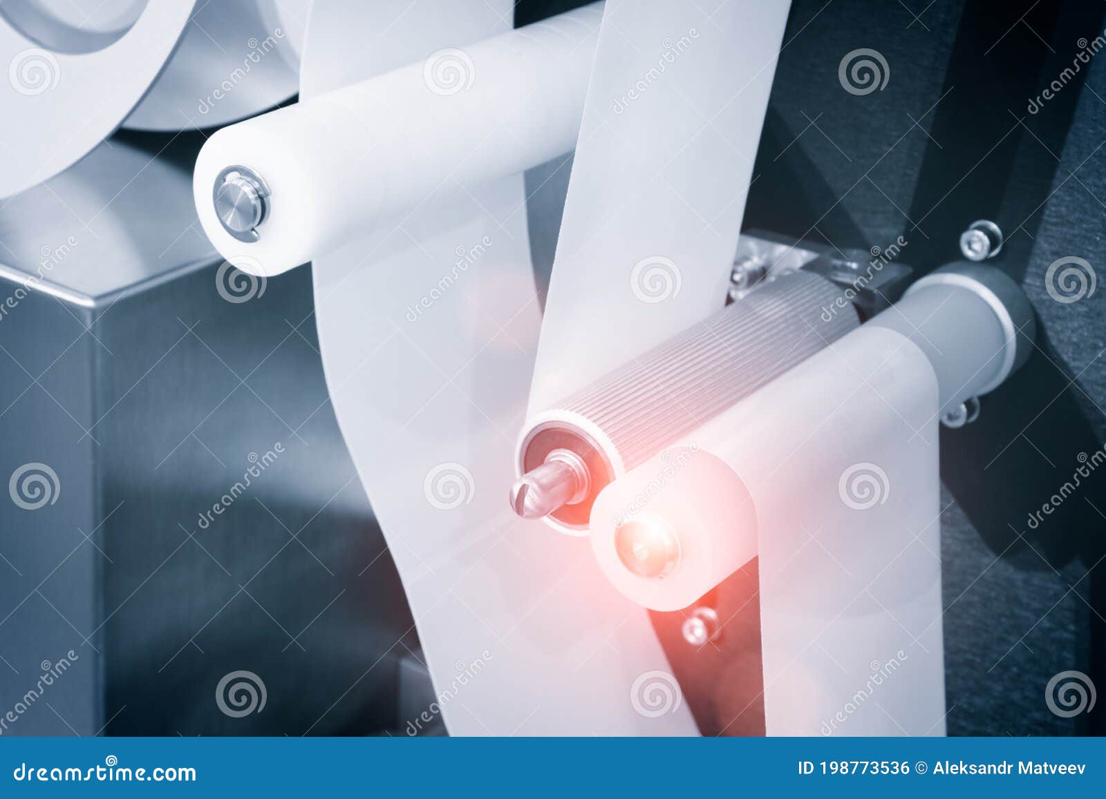 Automatic Labeling Machine. the Labeled Tape is Located between the ...