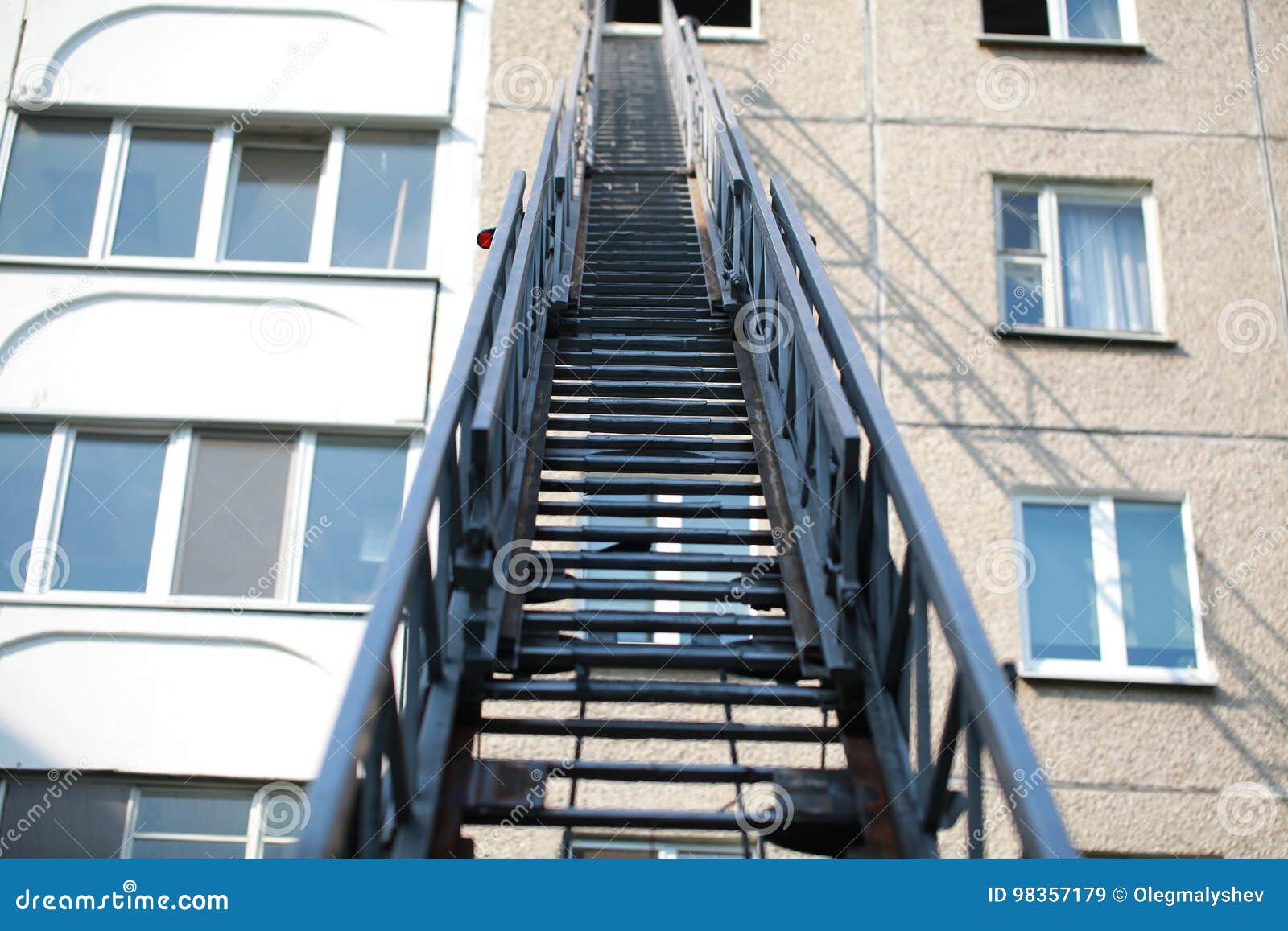 Automatic Ladder of Fire Engine To a Burning House Stock Image - Image ...